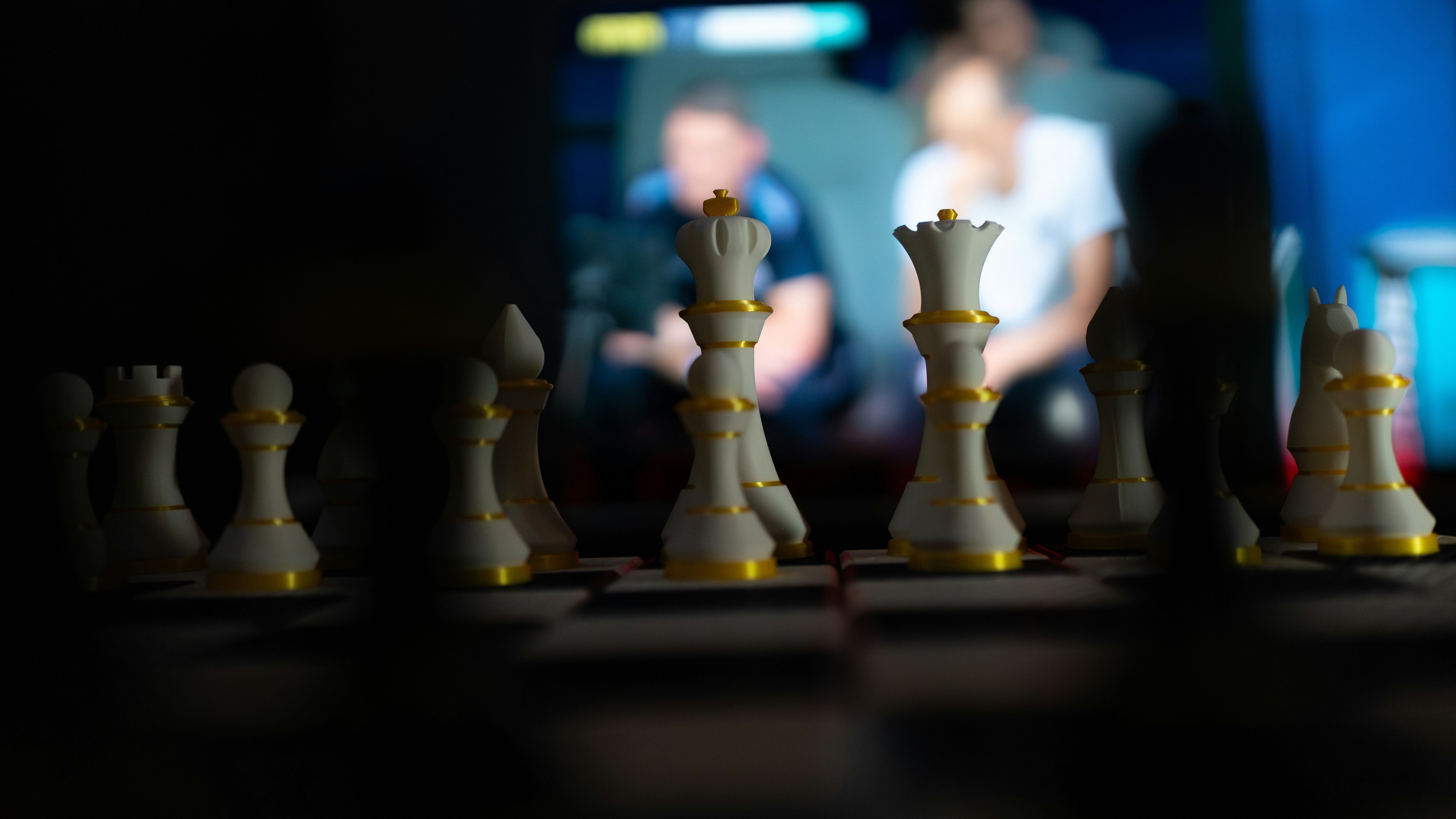 Strategic Chessboard: Kings Guarded in a Dim Theater