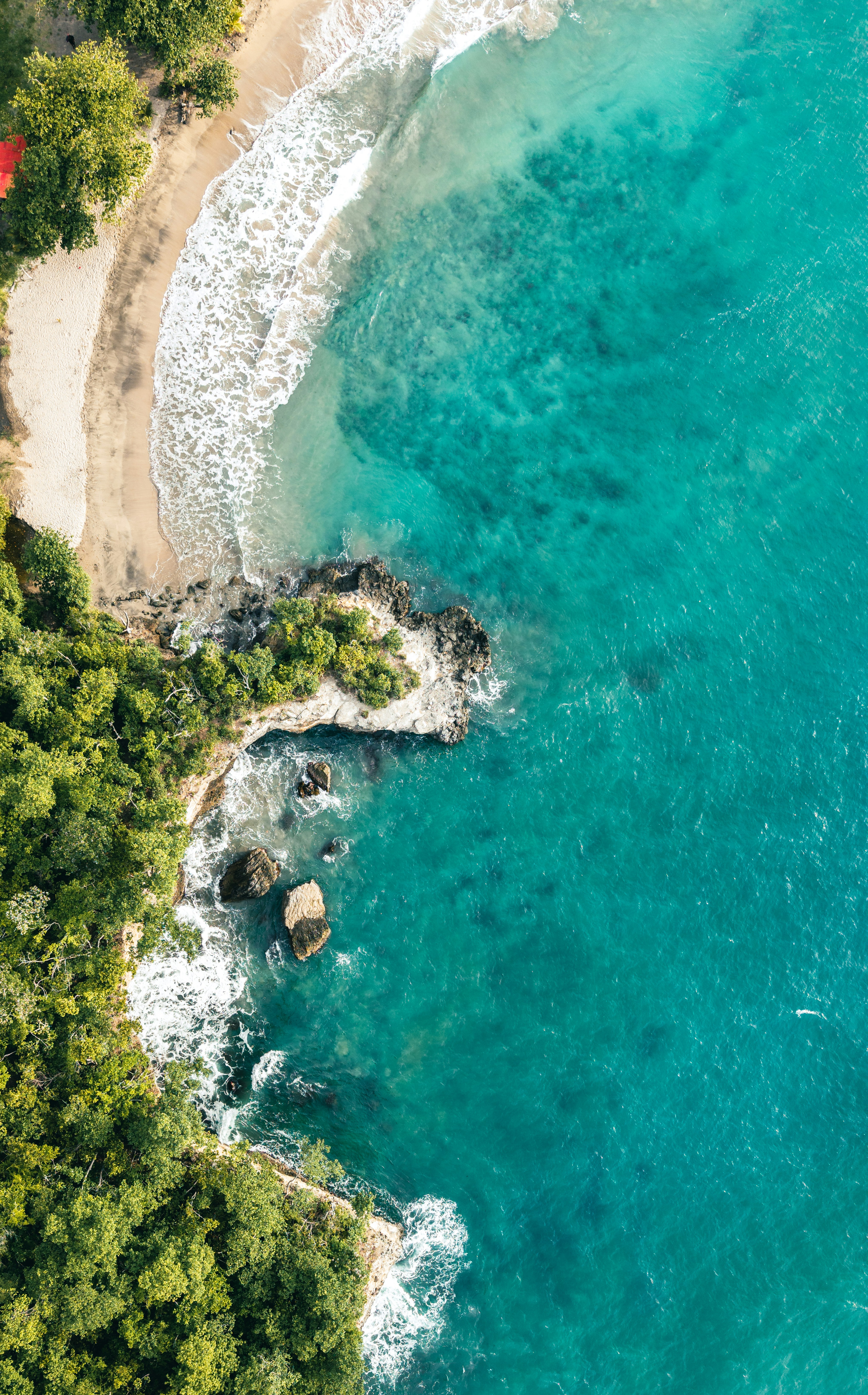Emerald Coastline: Aerial Rendezvous with Turquoise Waters