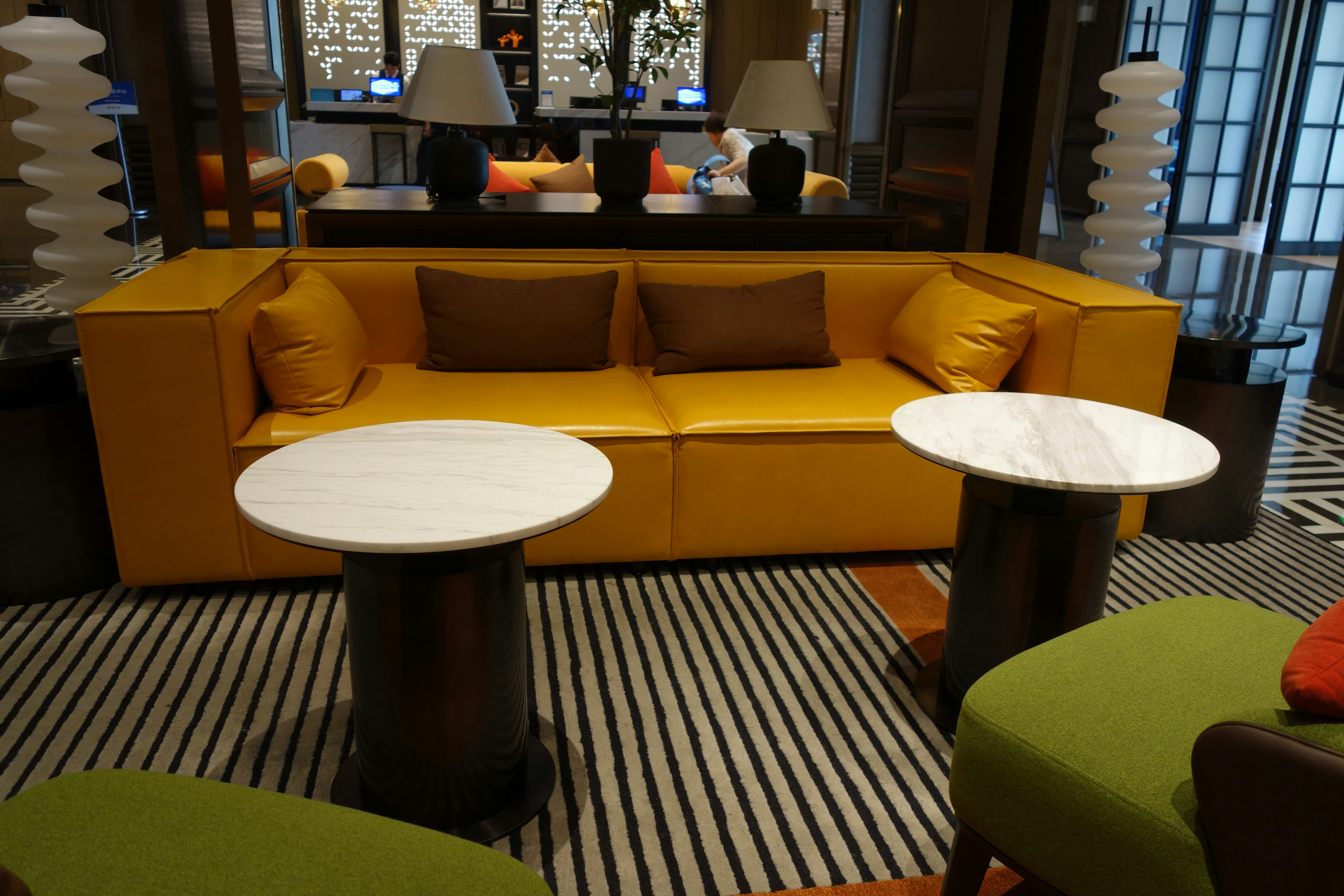 Amber Sofa in a Modern Lobby: Quiet Center of Warmth