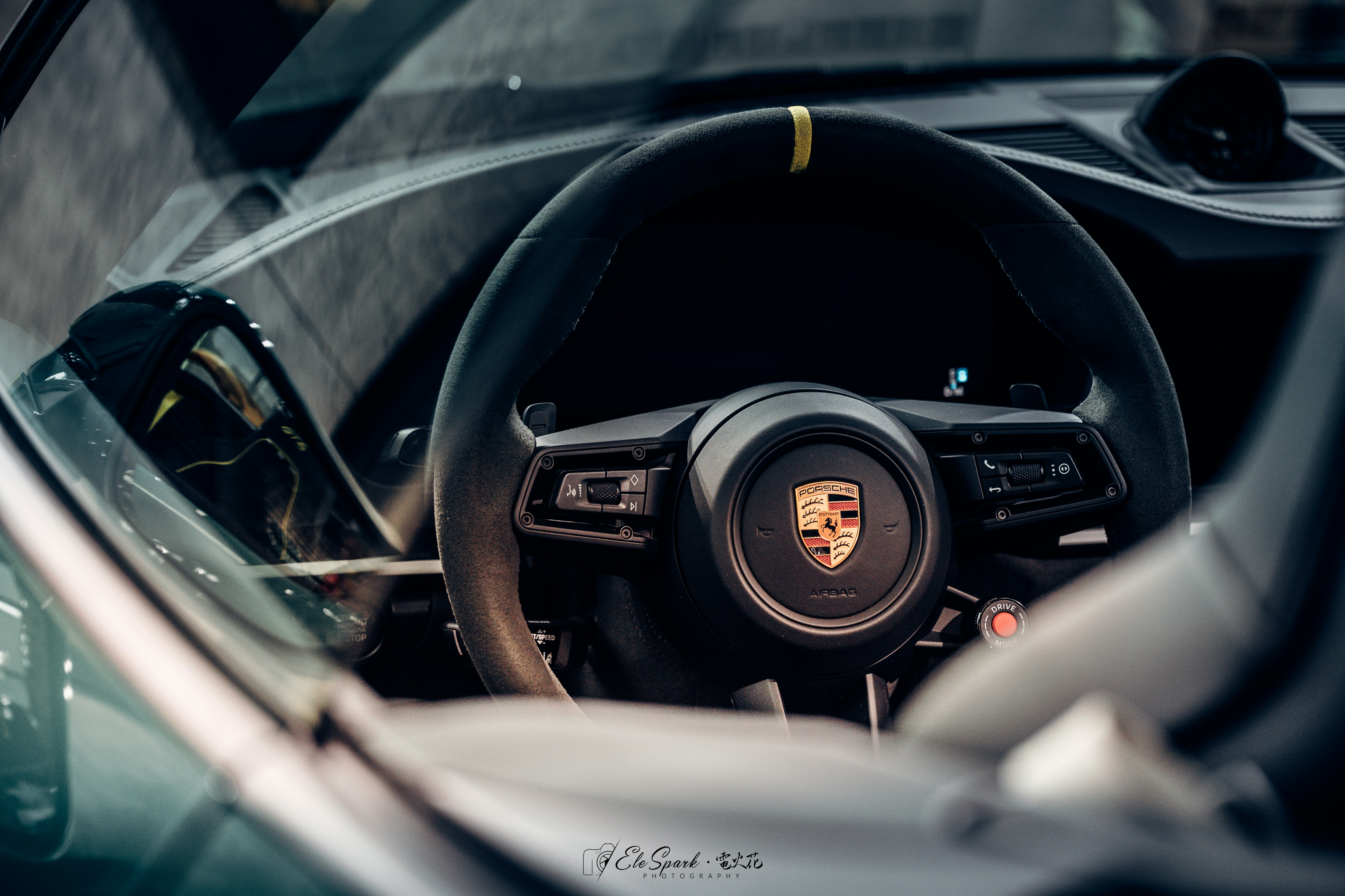 Centered Pace: The Porsche steering wheel draws you into the cockpit
