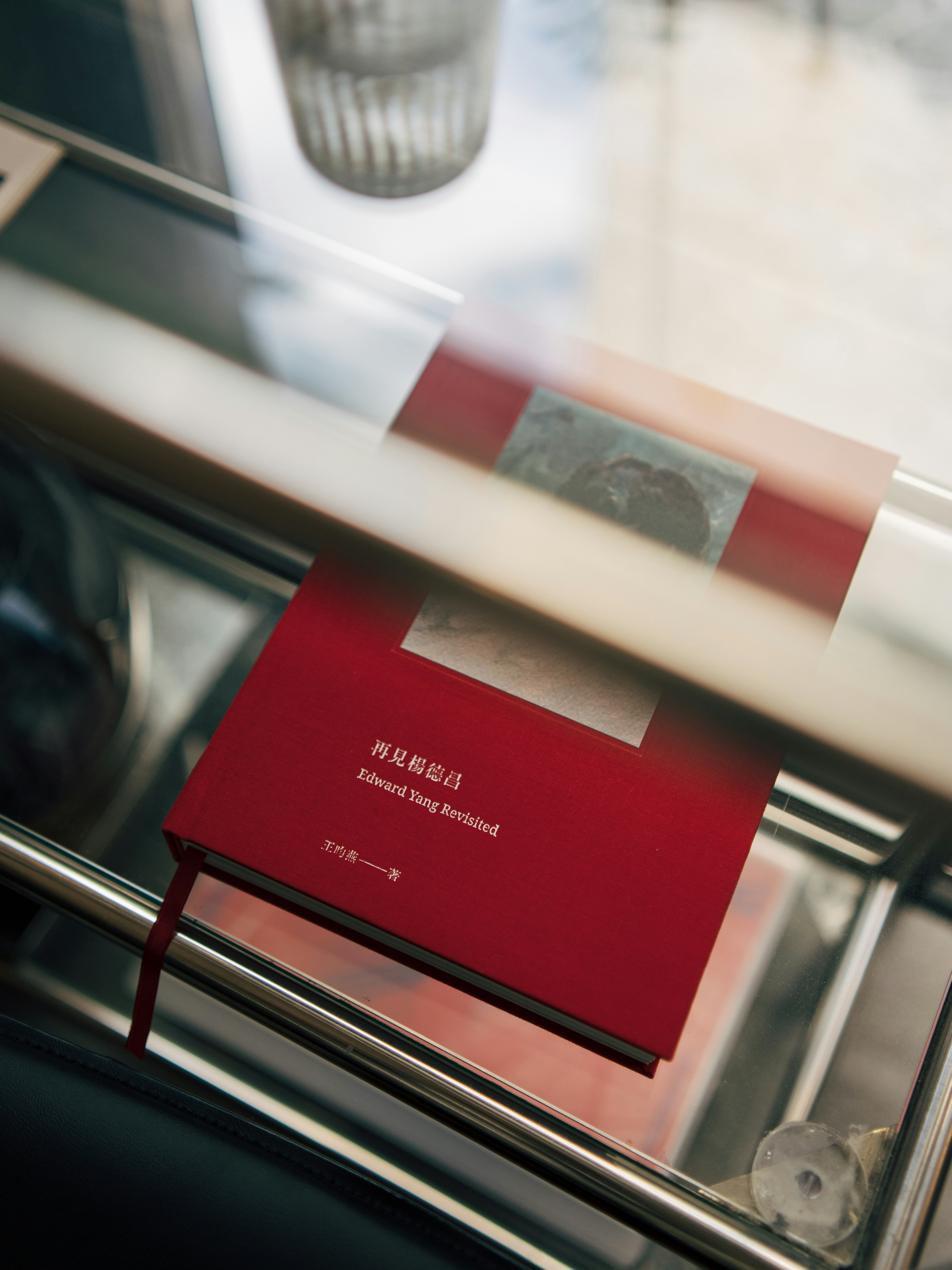 Red Edition: A Passport-Stamped Moment on the Escalator