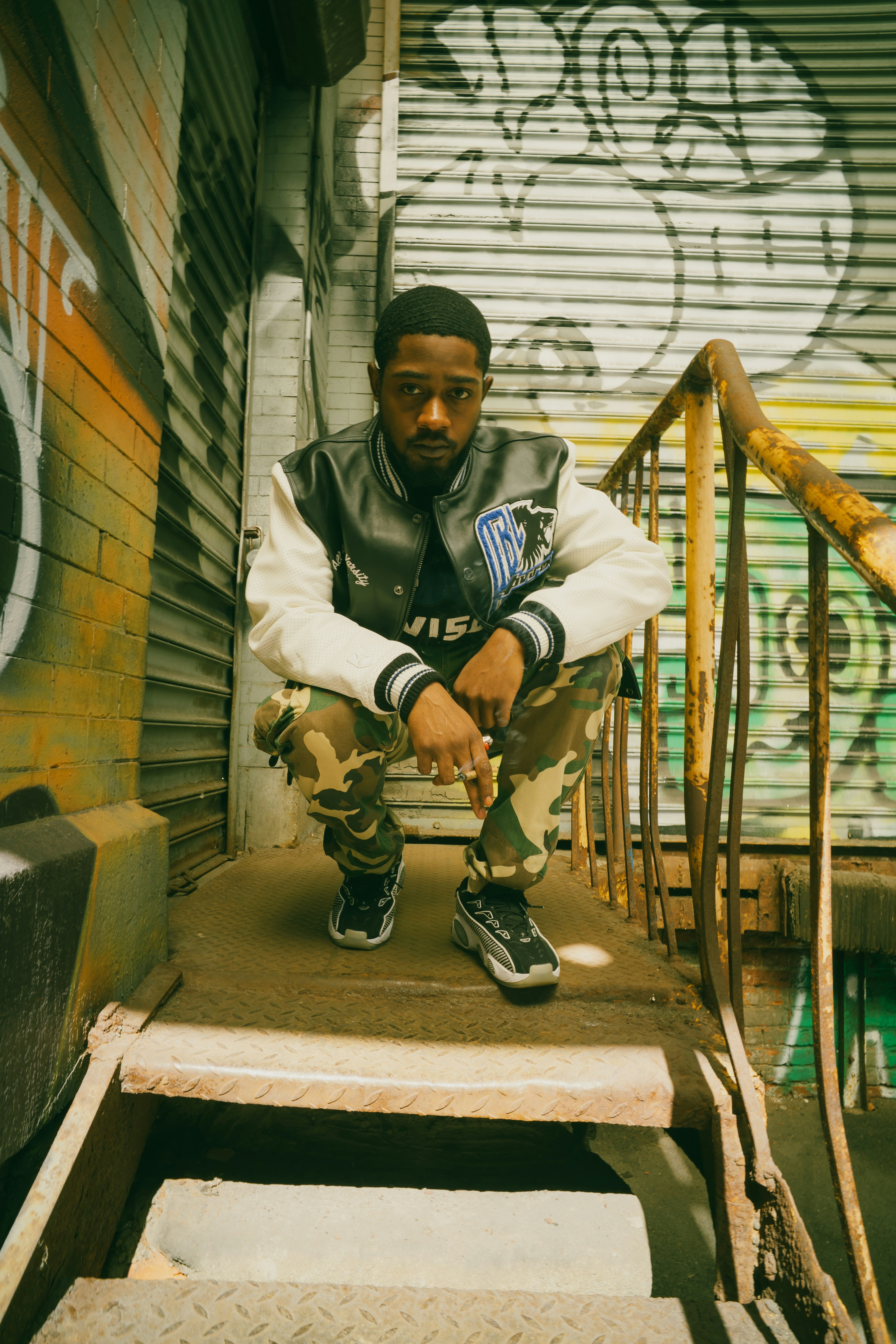 Urban Echoes: A Quiet Pose on Rusted Steps