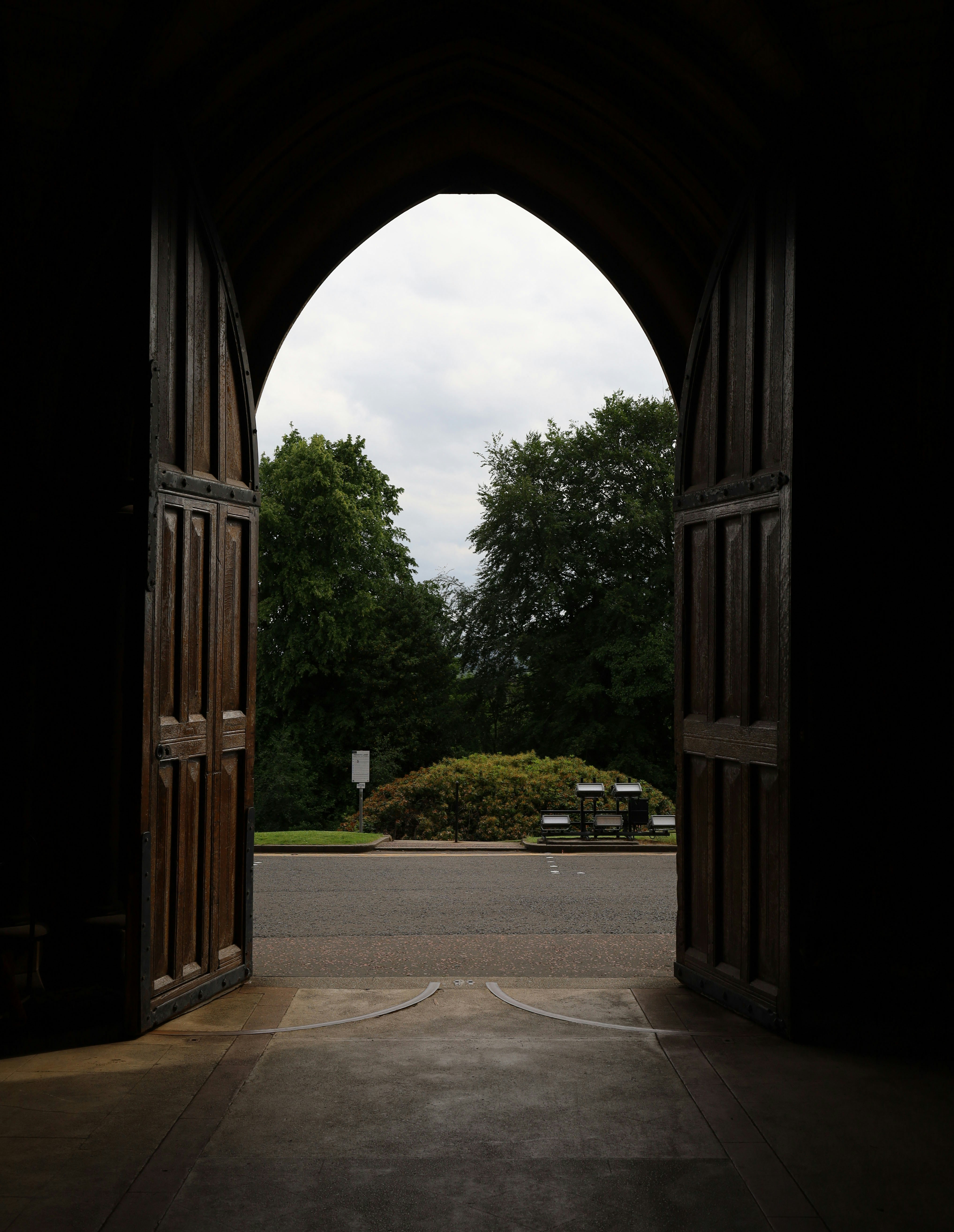 Doorway to the Park: Framed Light Beyond the Arch