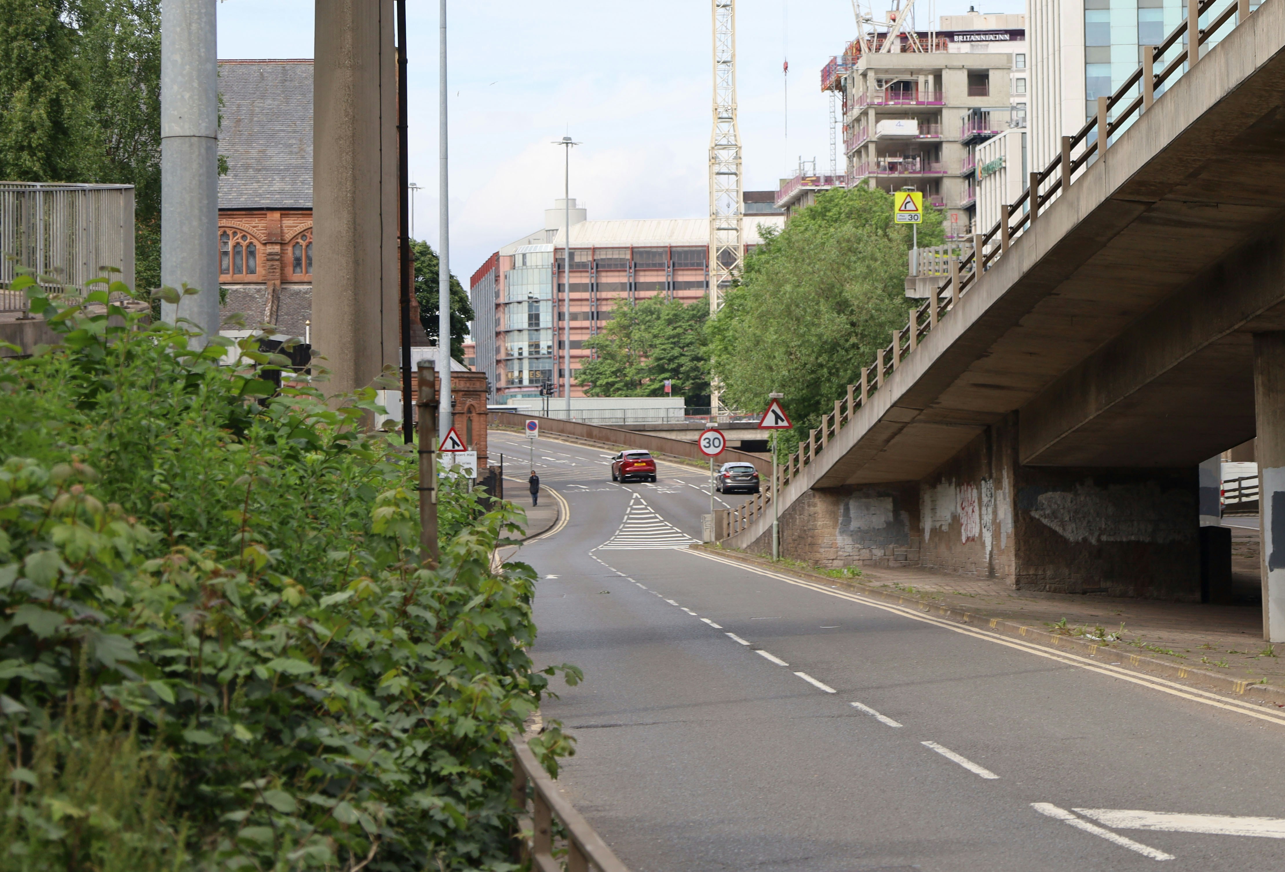 Urban Corridor: The Road Under the Concrete Overpass