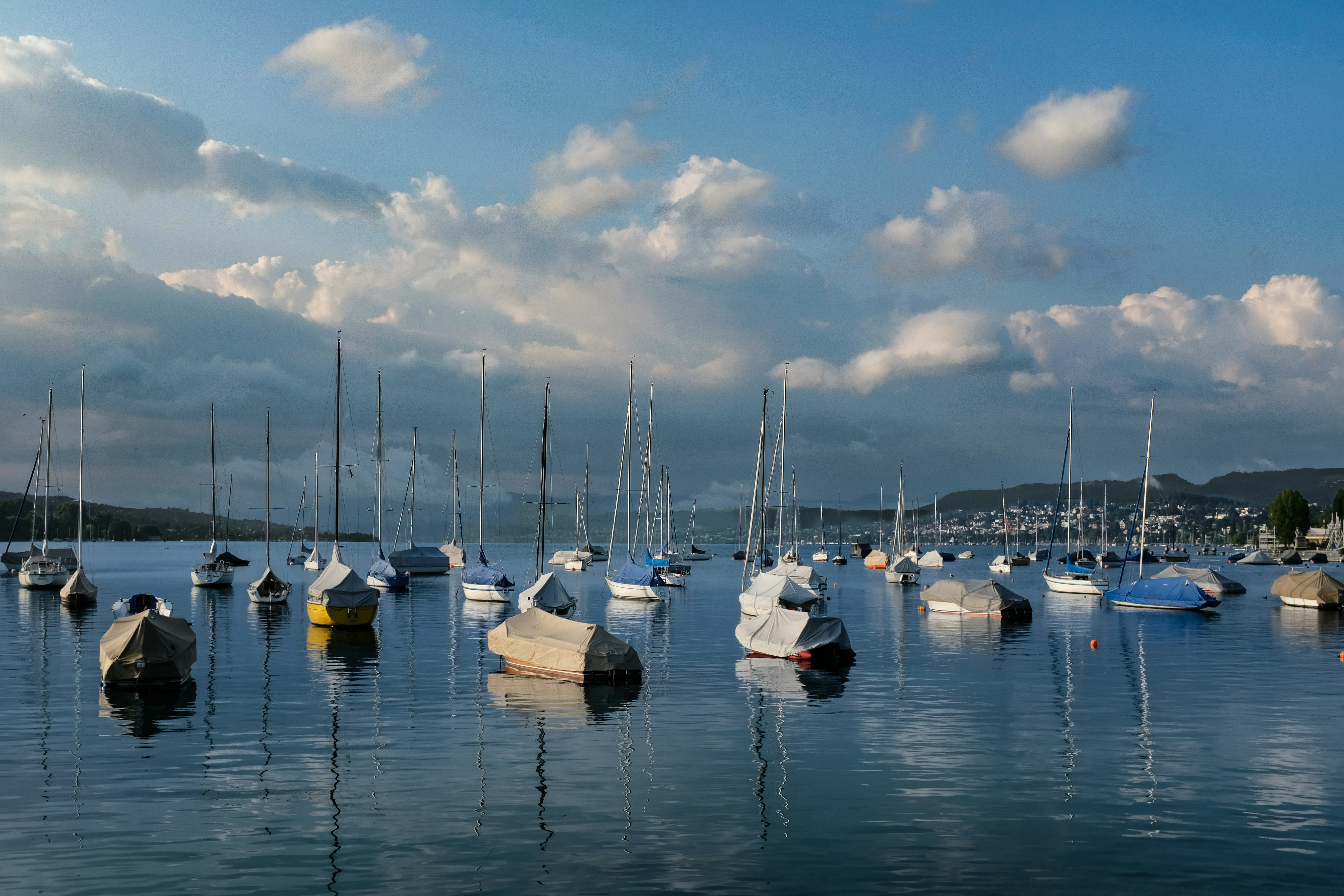 Silent Fleet at Dusk: Boats Nestled in a Calm Harborscape