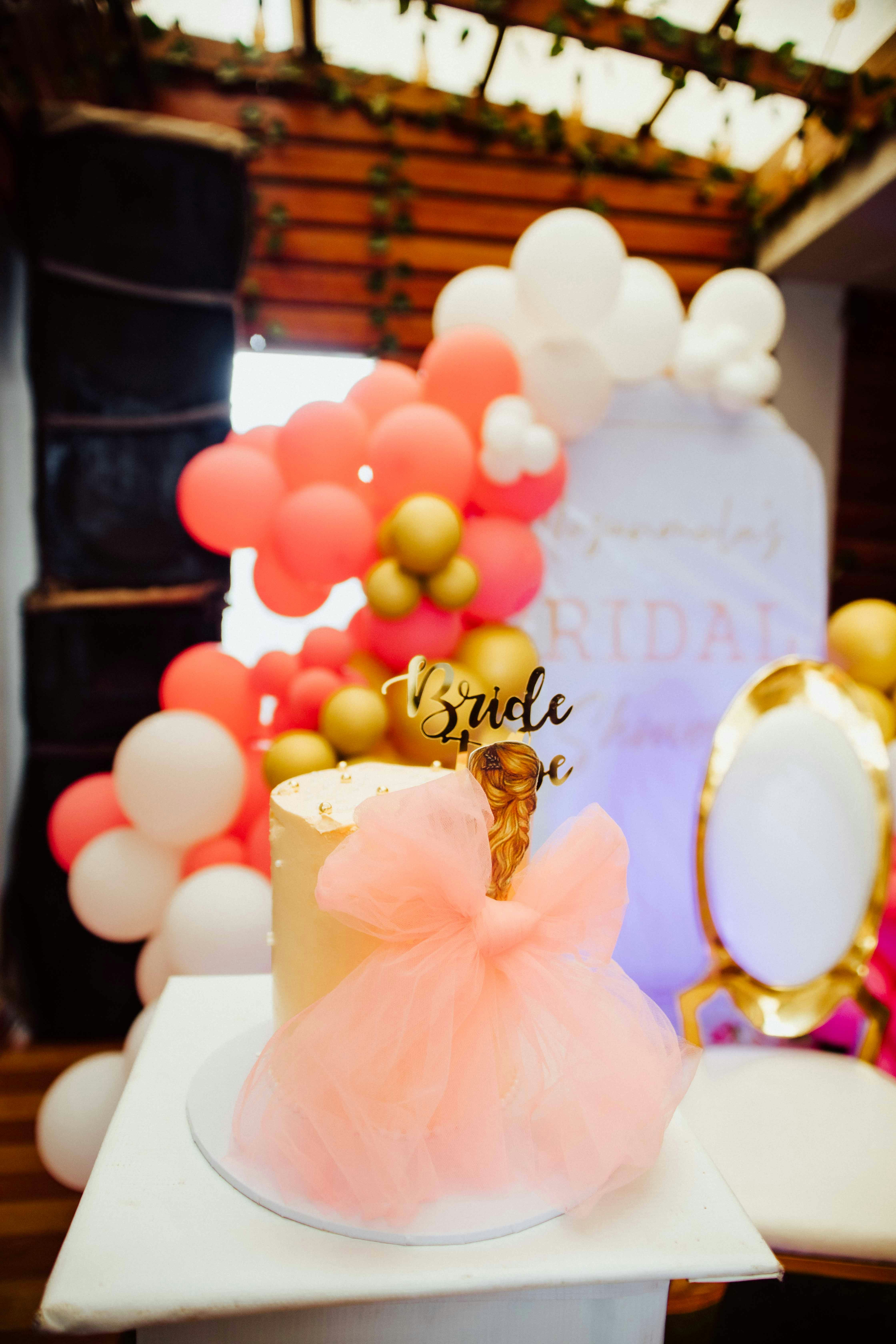 Peach Tulle Birthday Cake at a Festive Bridal Shower Corner