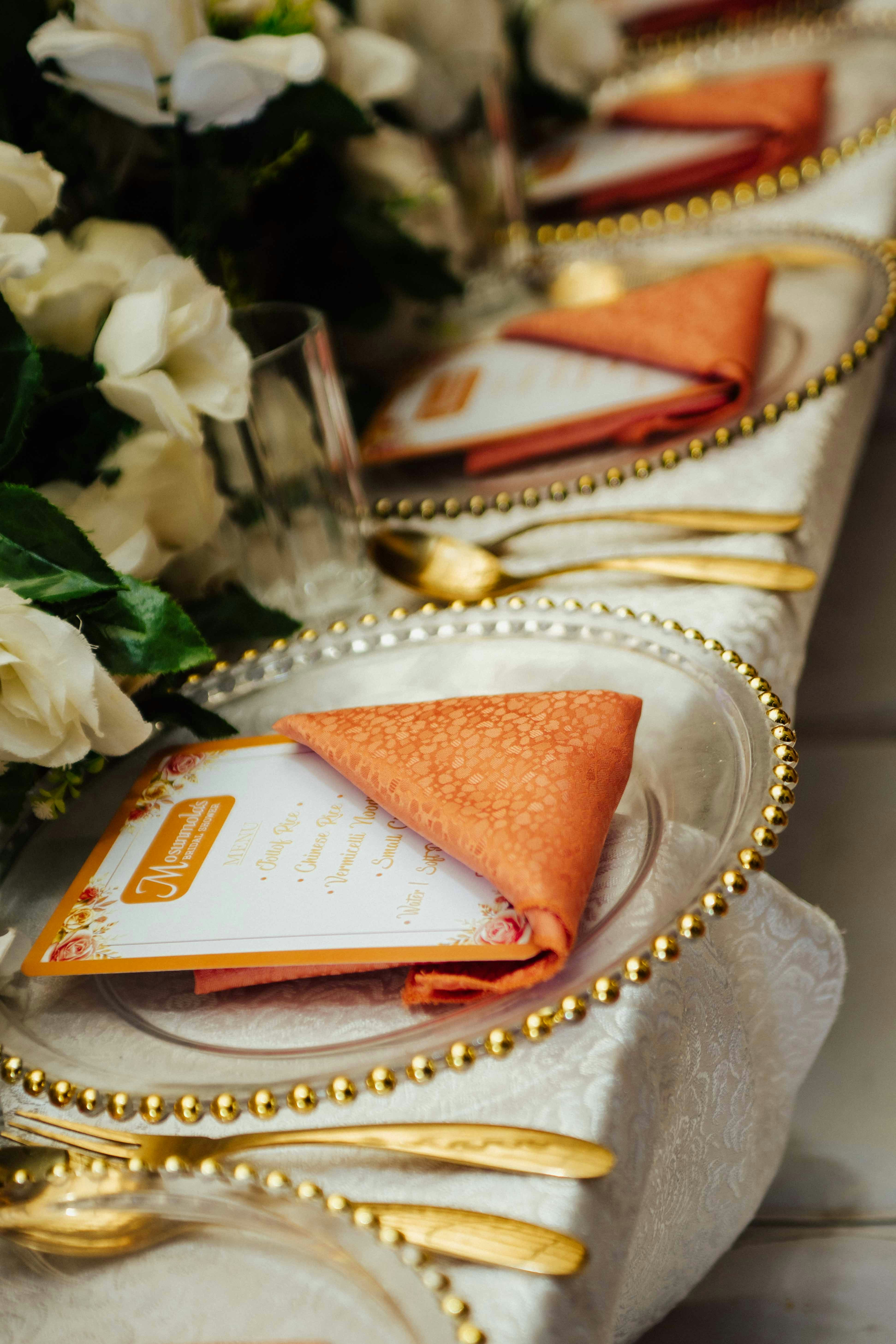 Orchestrated Table Setting: Gold Accents and Cream Florals