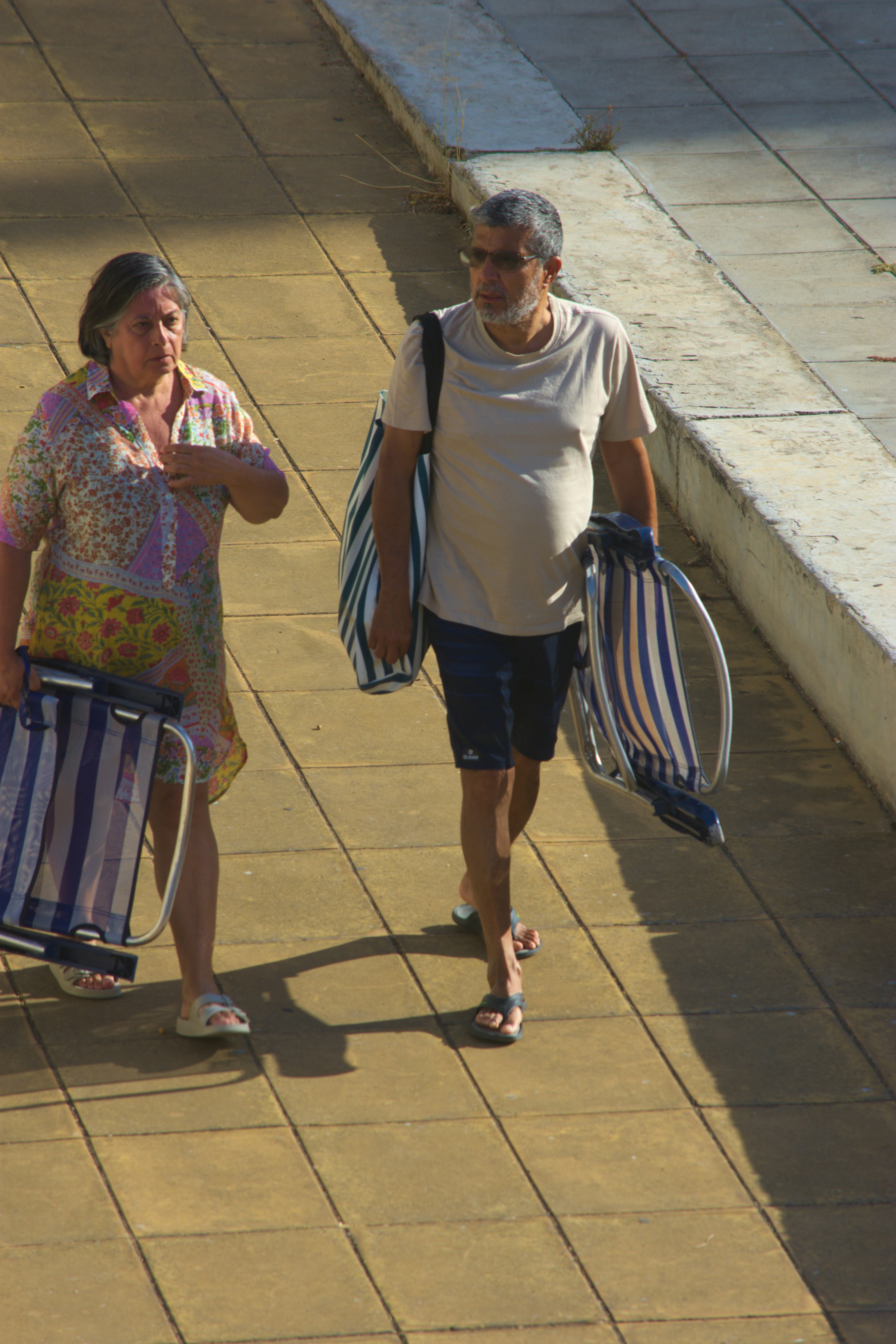 Evening Stroll with Striped Carry-Ons