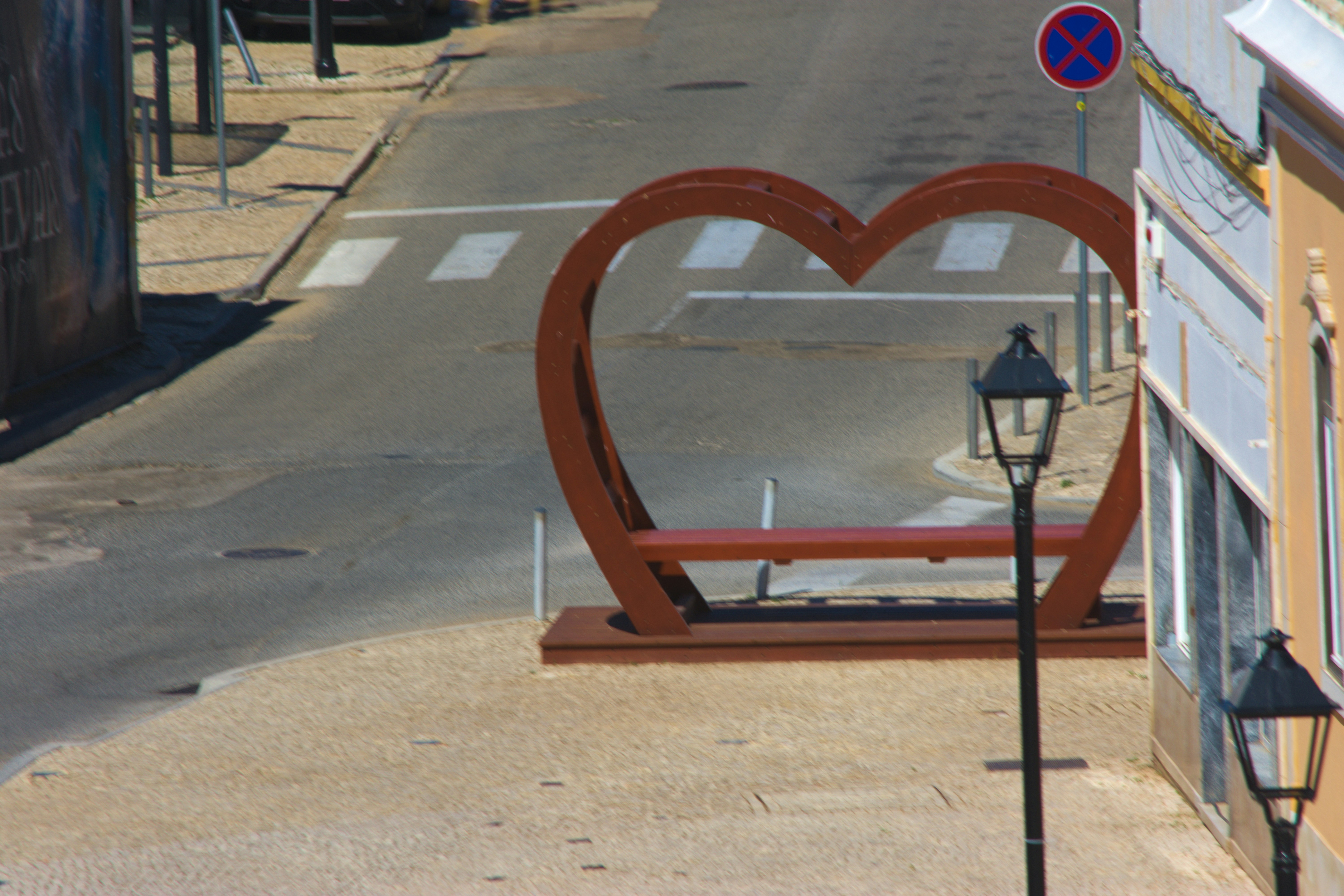 Heart of the Street: Red Sculpture Framing the Lane