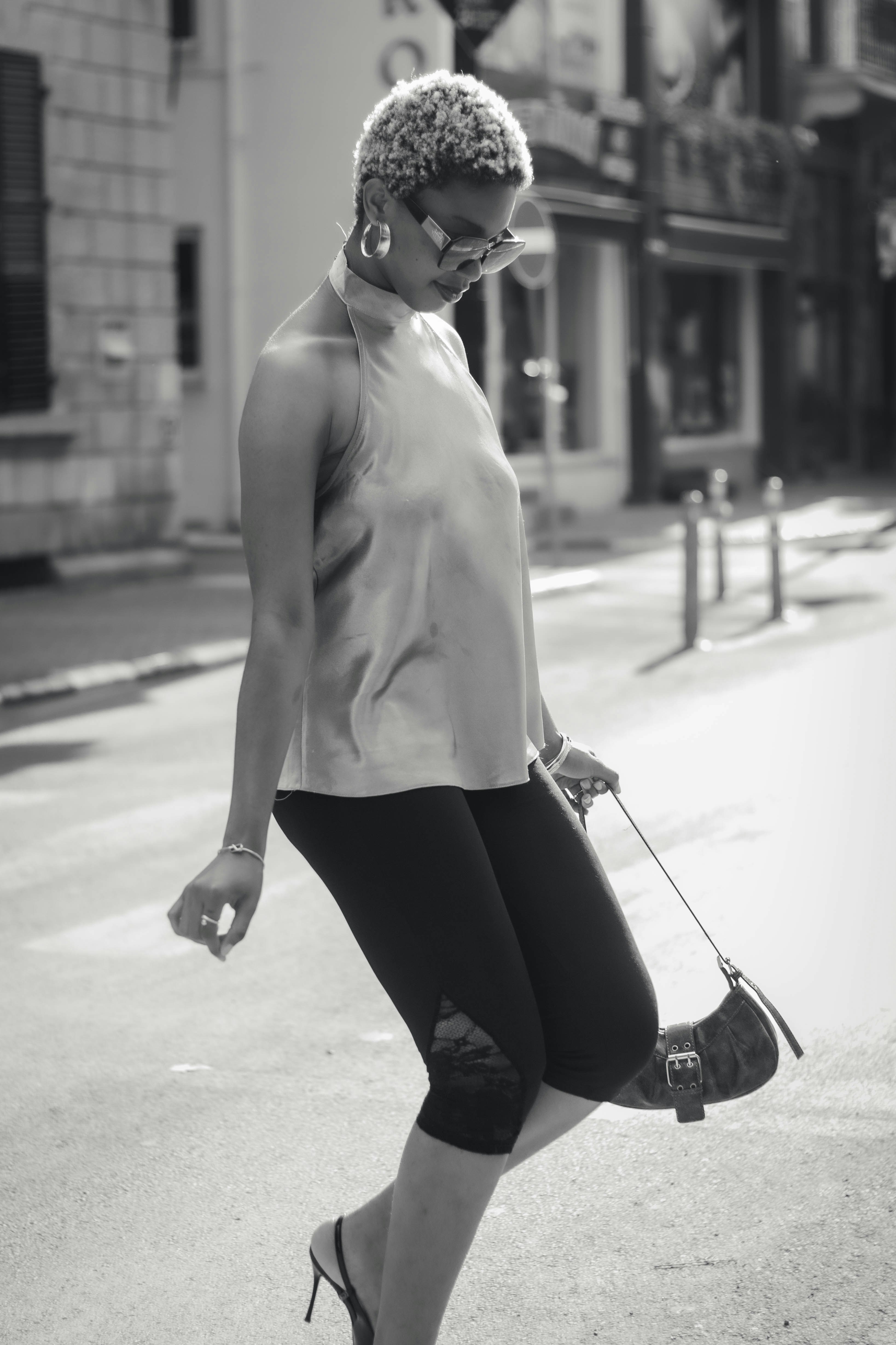 Street Serenade: A Solitary Moment in Monochrome