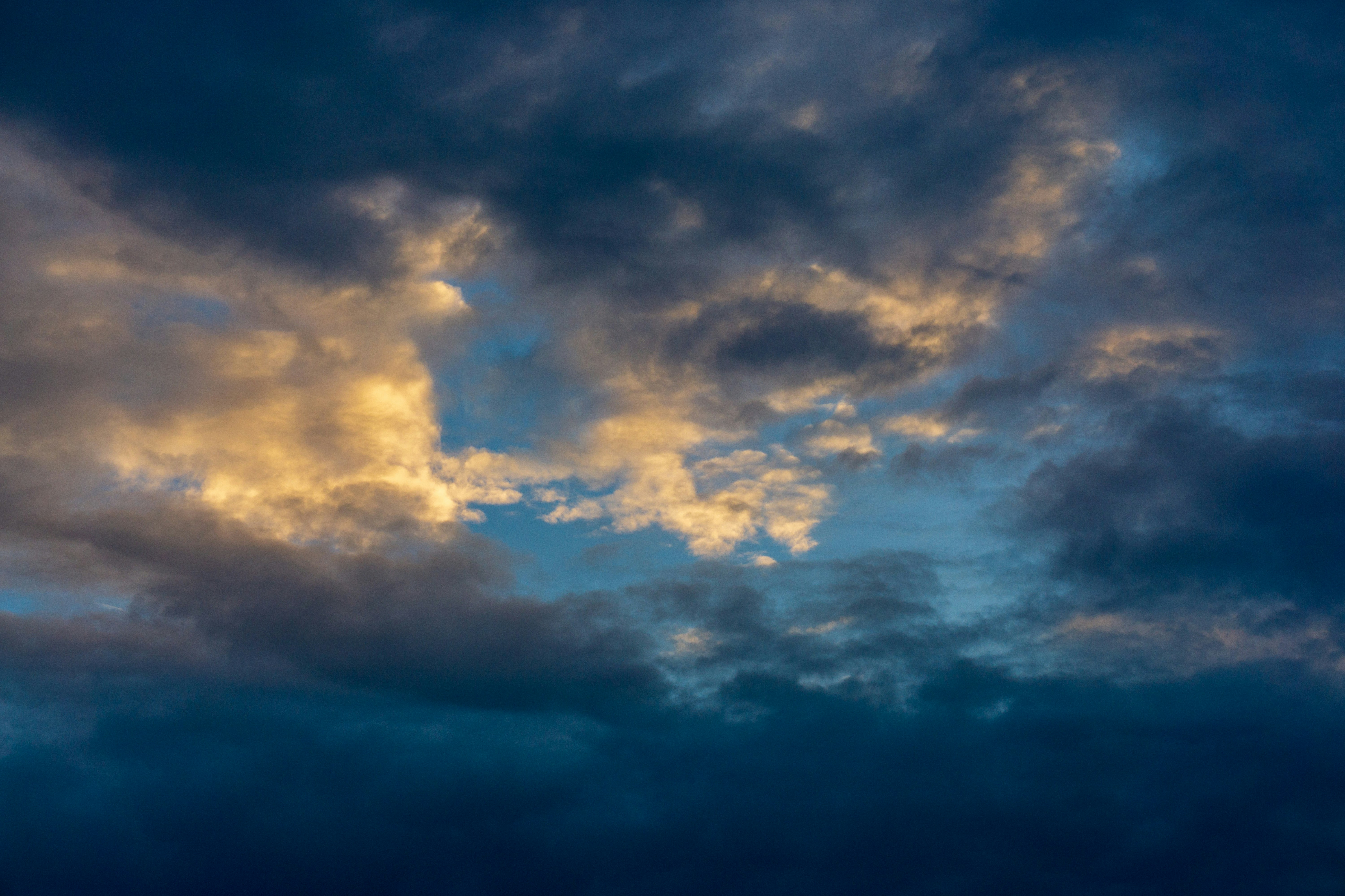 Sunlit Break in the Evening Sky