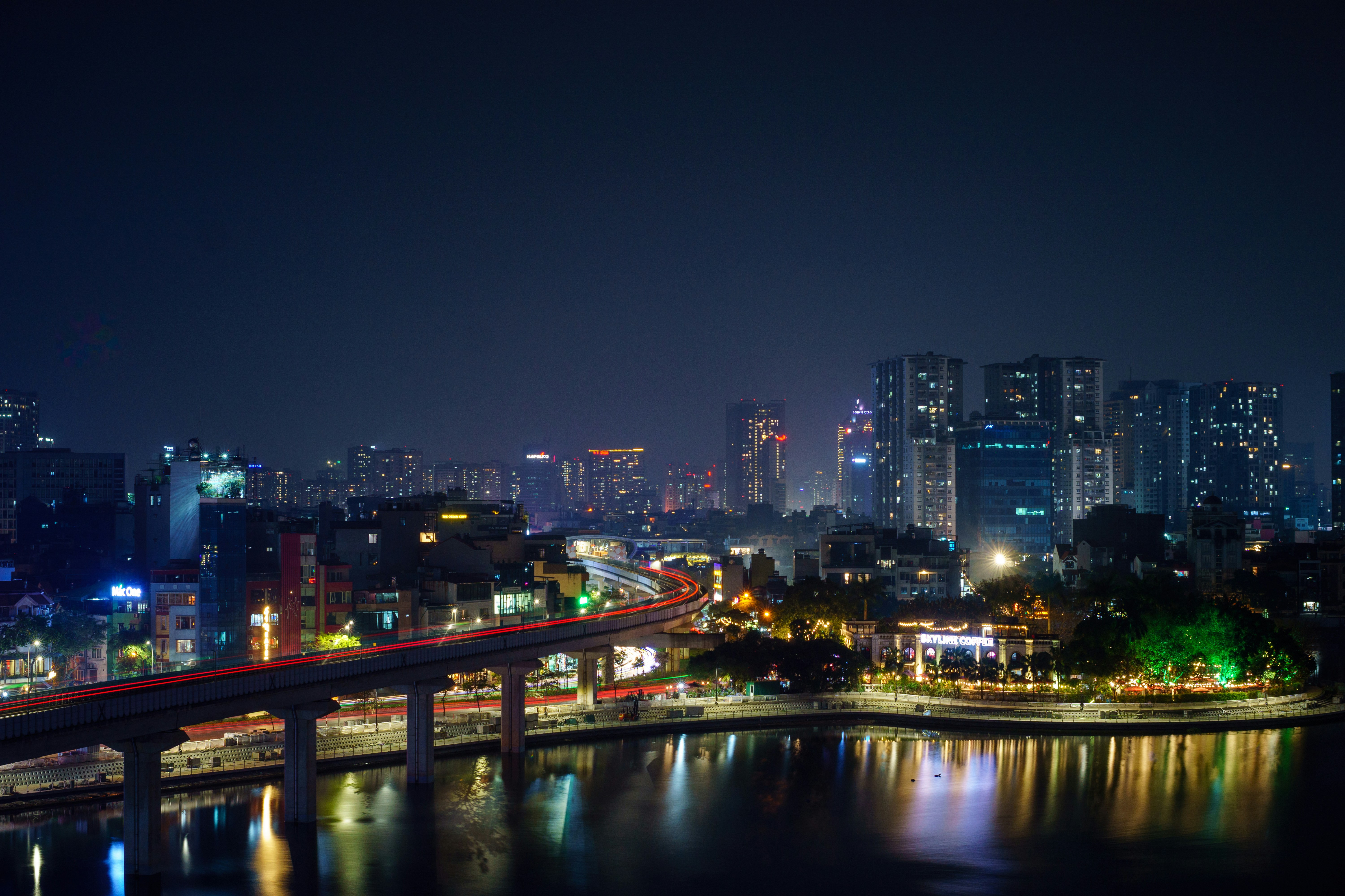 Night Traffic over the River: A Neon-Calm Cityscape
