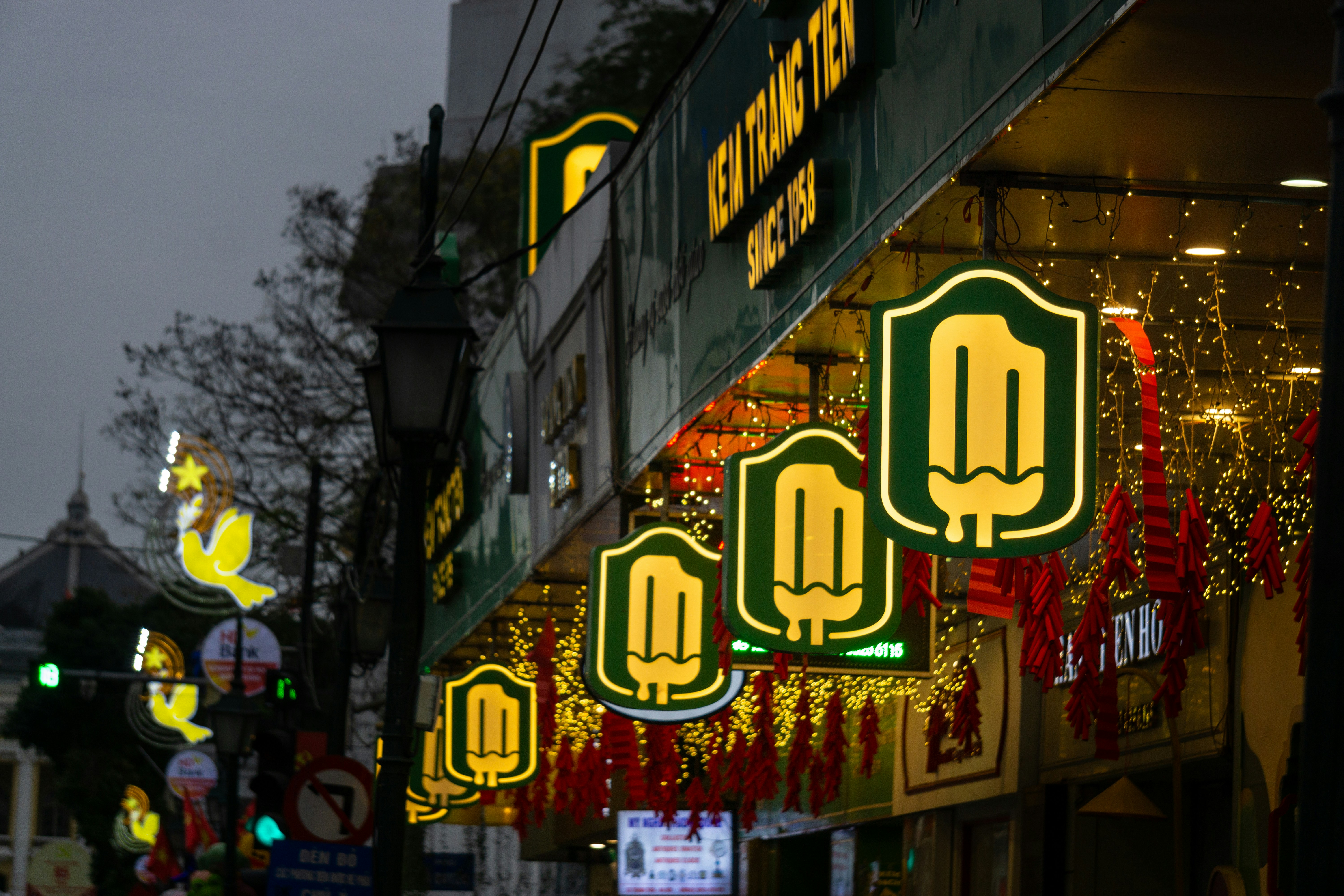 Lanterned storefronts: festive lanterns on a city street
