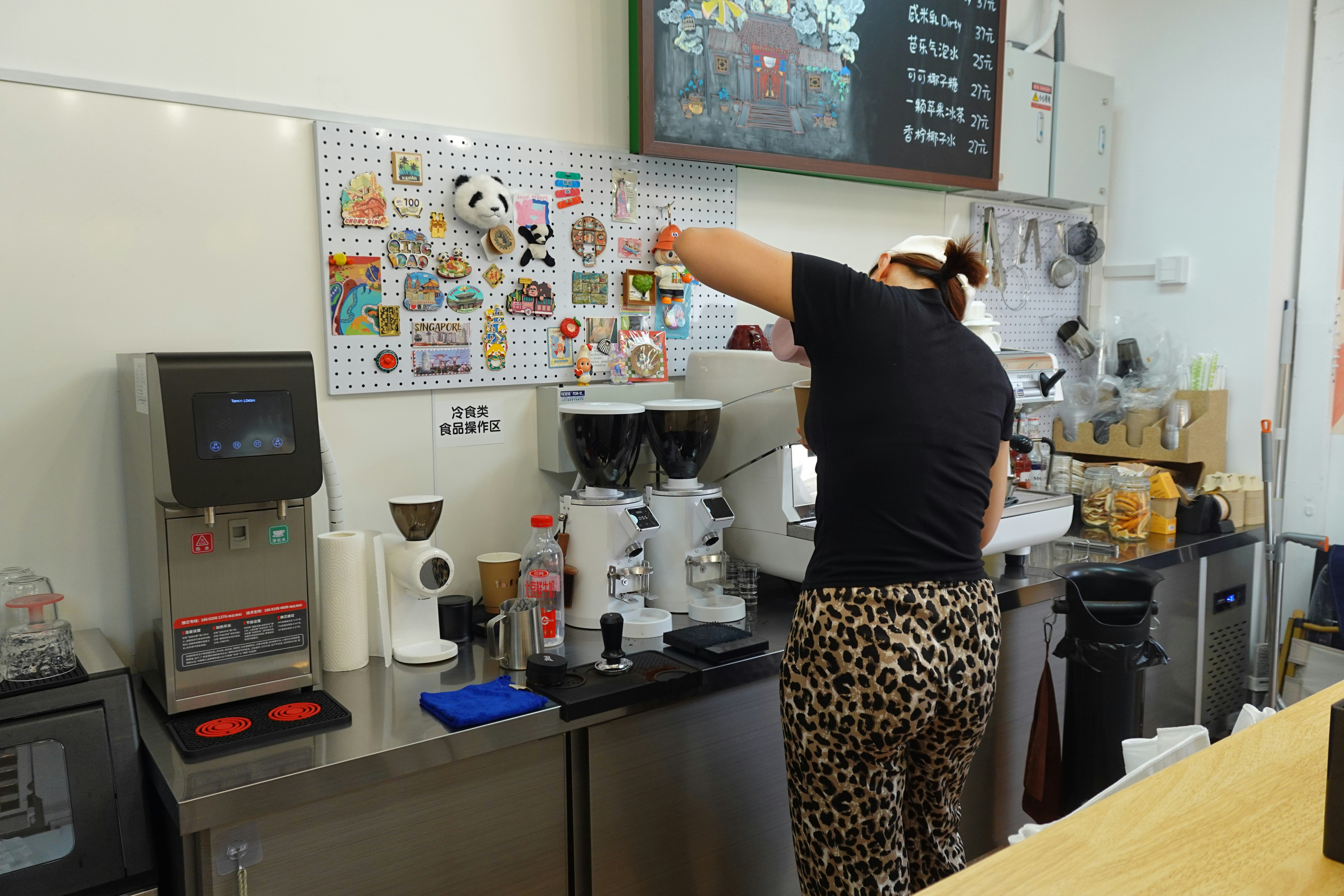 Barista in Leopard Print: Crafting Coffee Behind the Counter