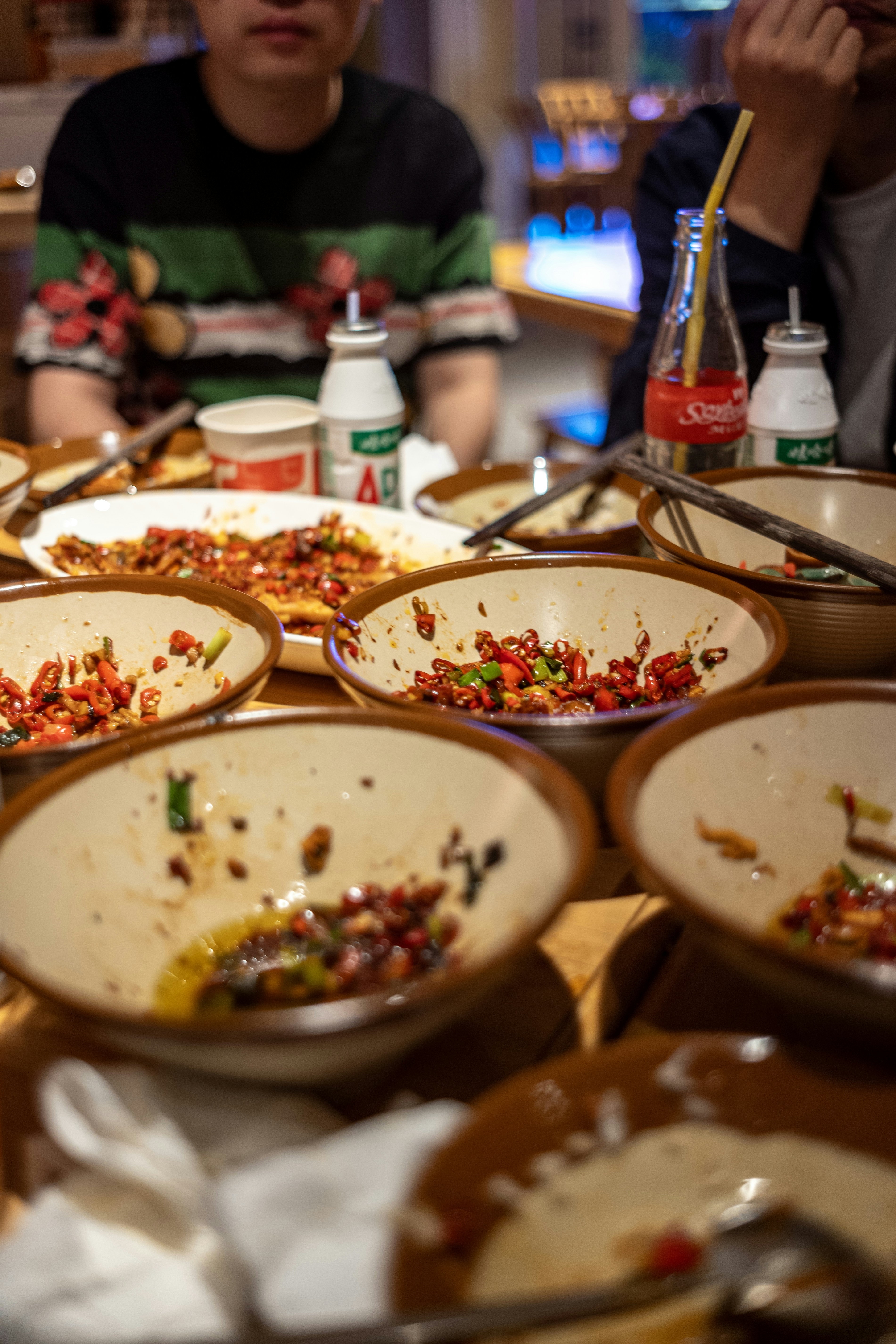 Dinner Afterglow: Bowls, Bottles, and Shared Moments