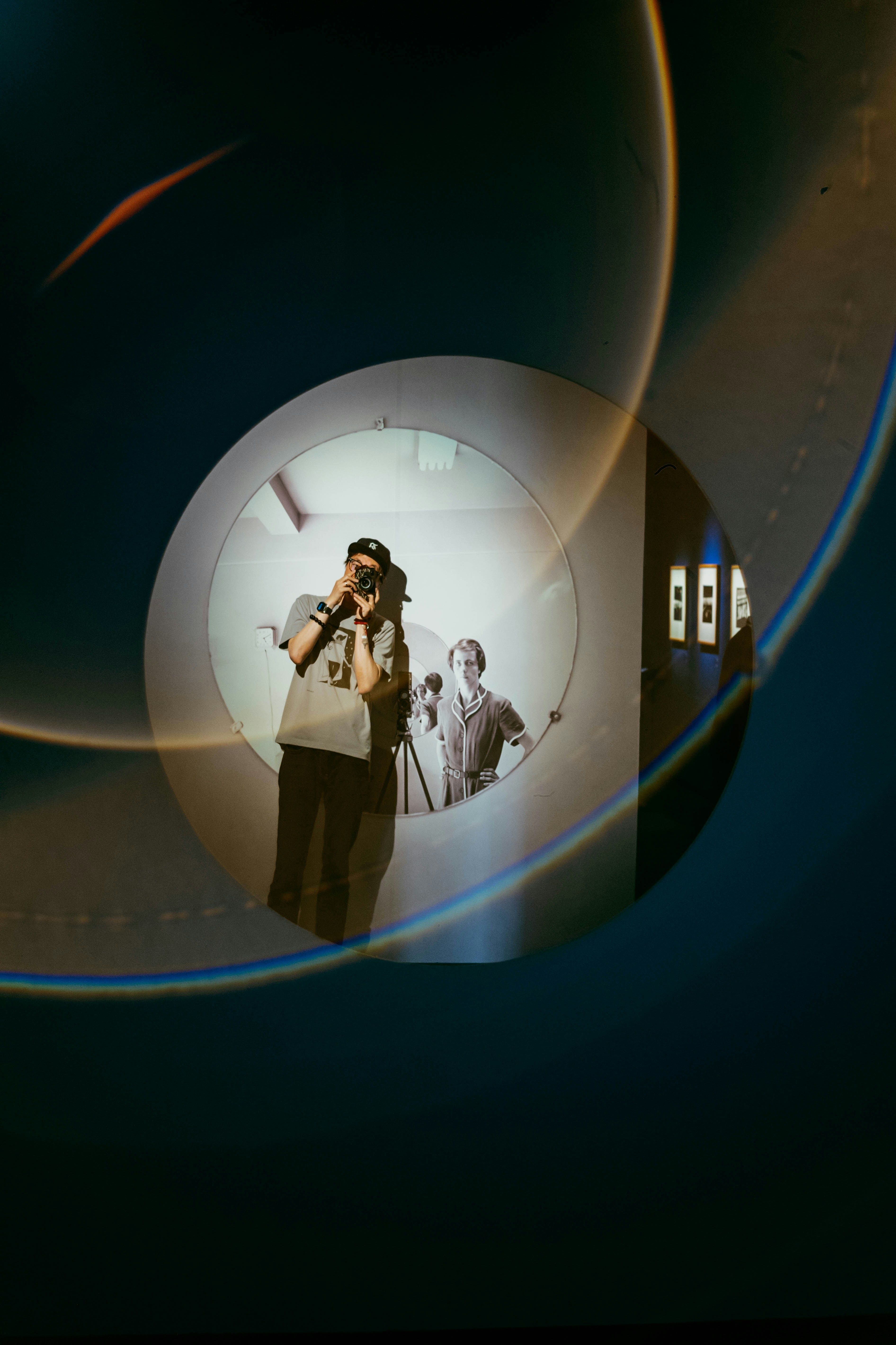 Self-Portrait in a Ring of Light: A Lens within a Lens