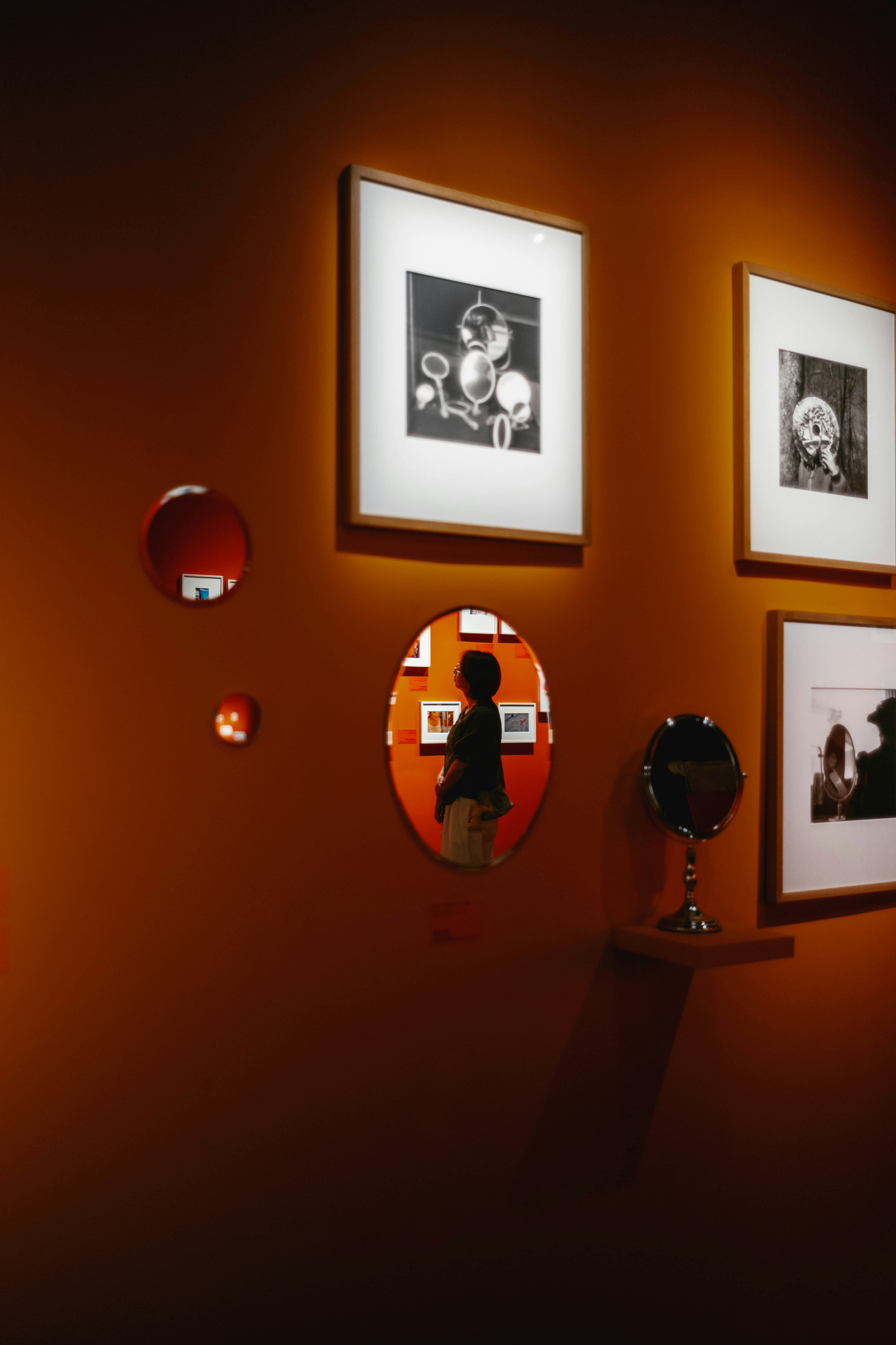 Red Gallery Echo: A Silhouette in an Orbit of Frames