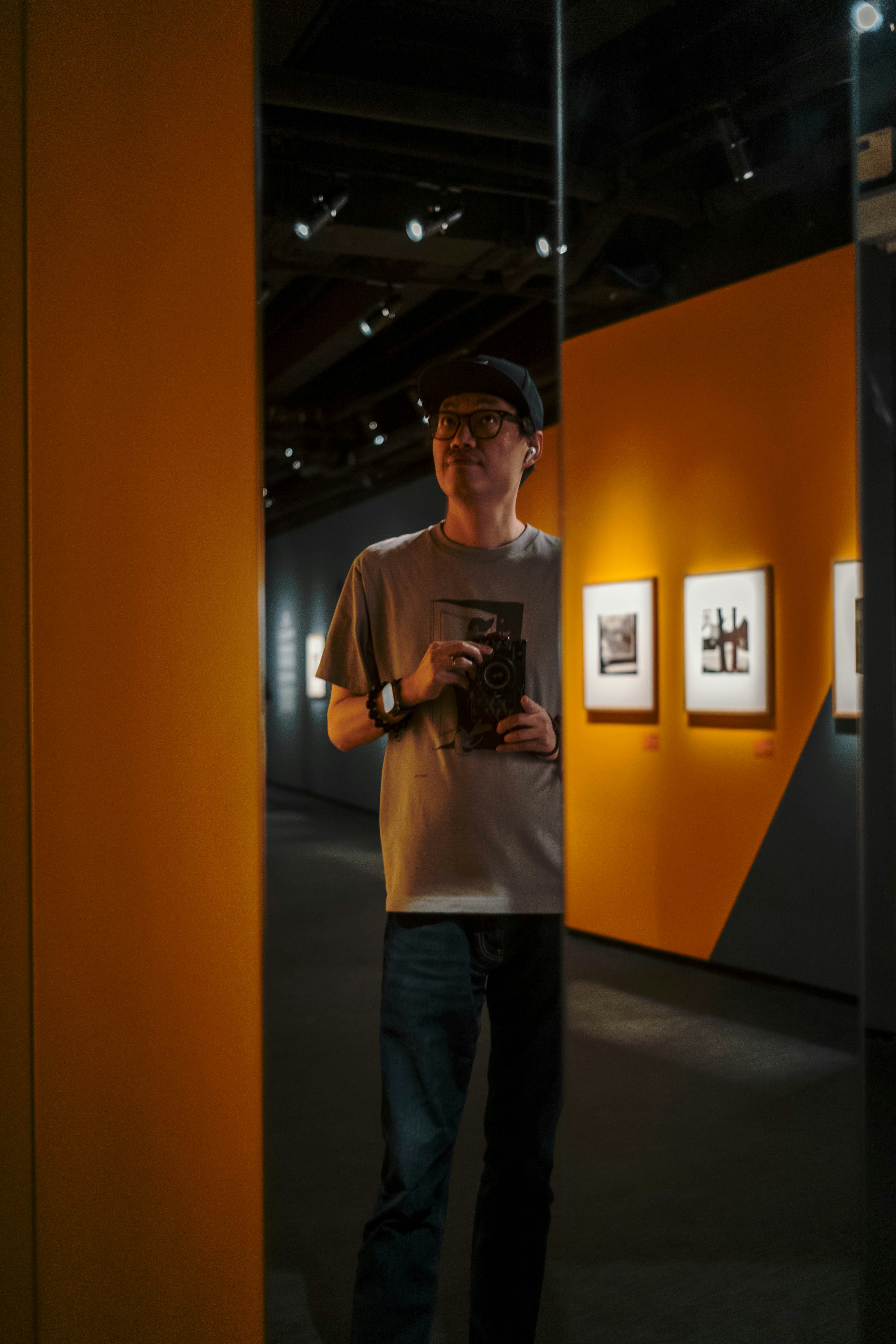 Portrait in an Orange-Walled Gallery