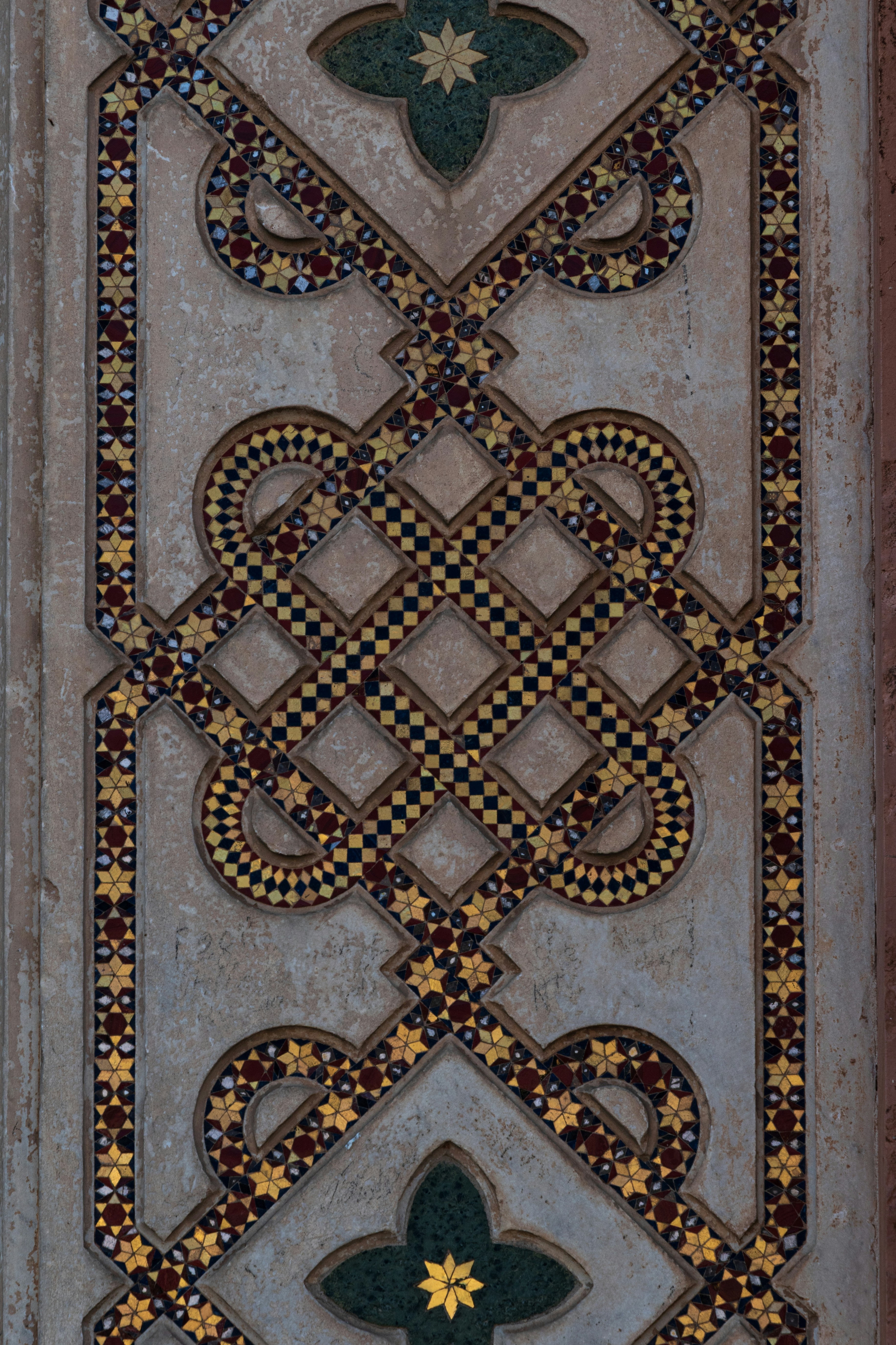 Intricate Moorish Tile Pattern Framed by Weathered Stone