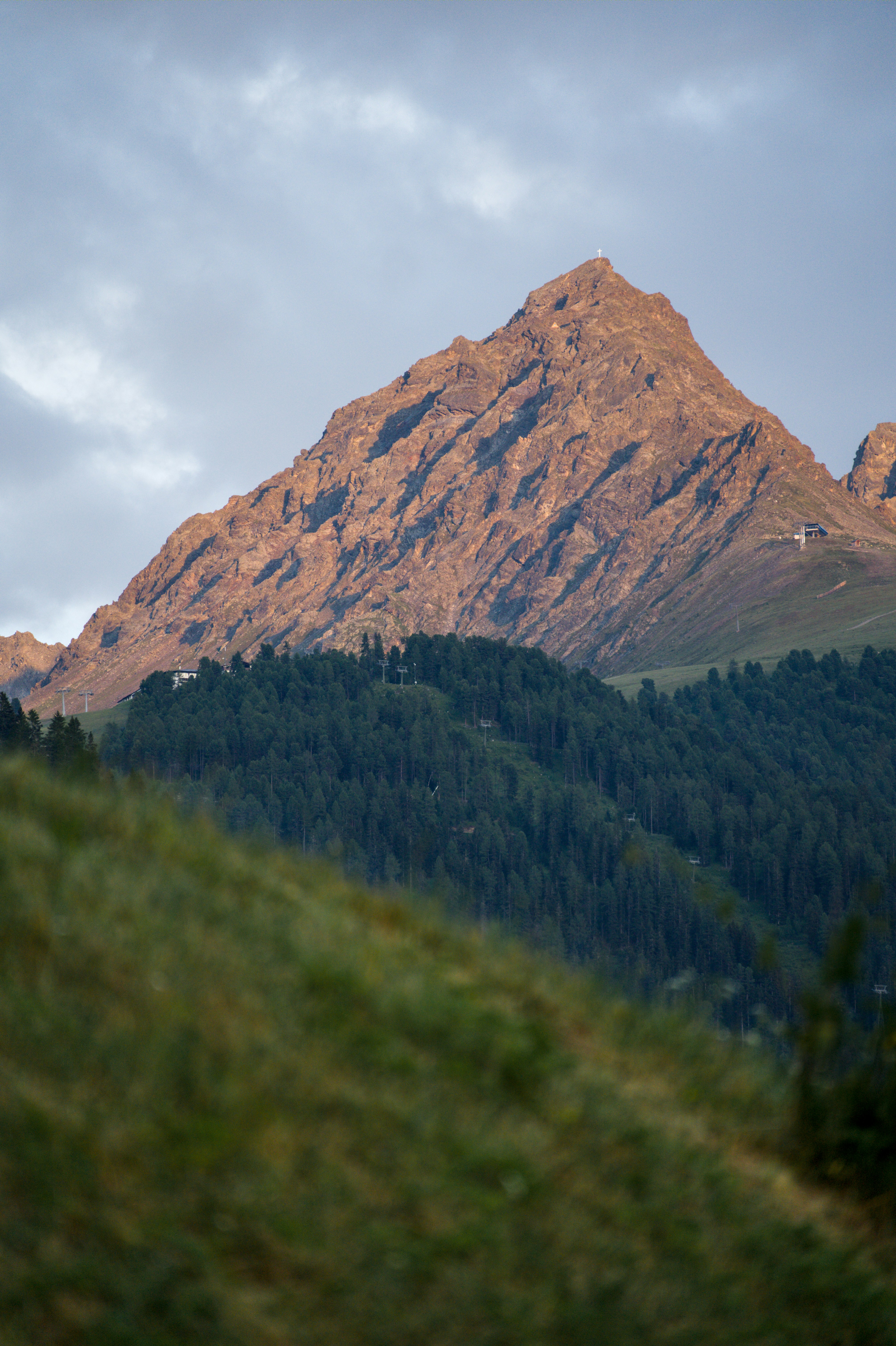 Sunlit Peak: A Ridge The Mountain Holds Over the Valley