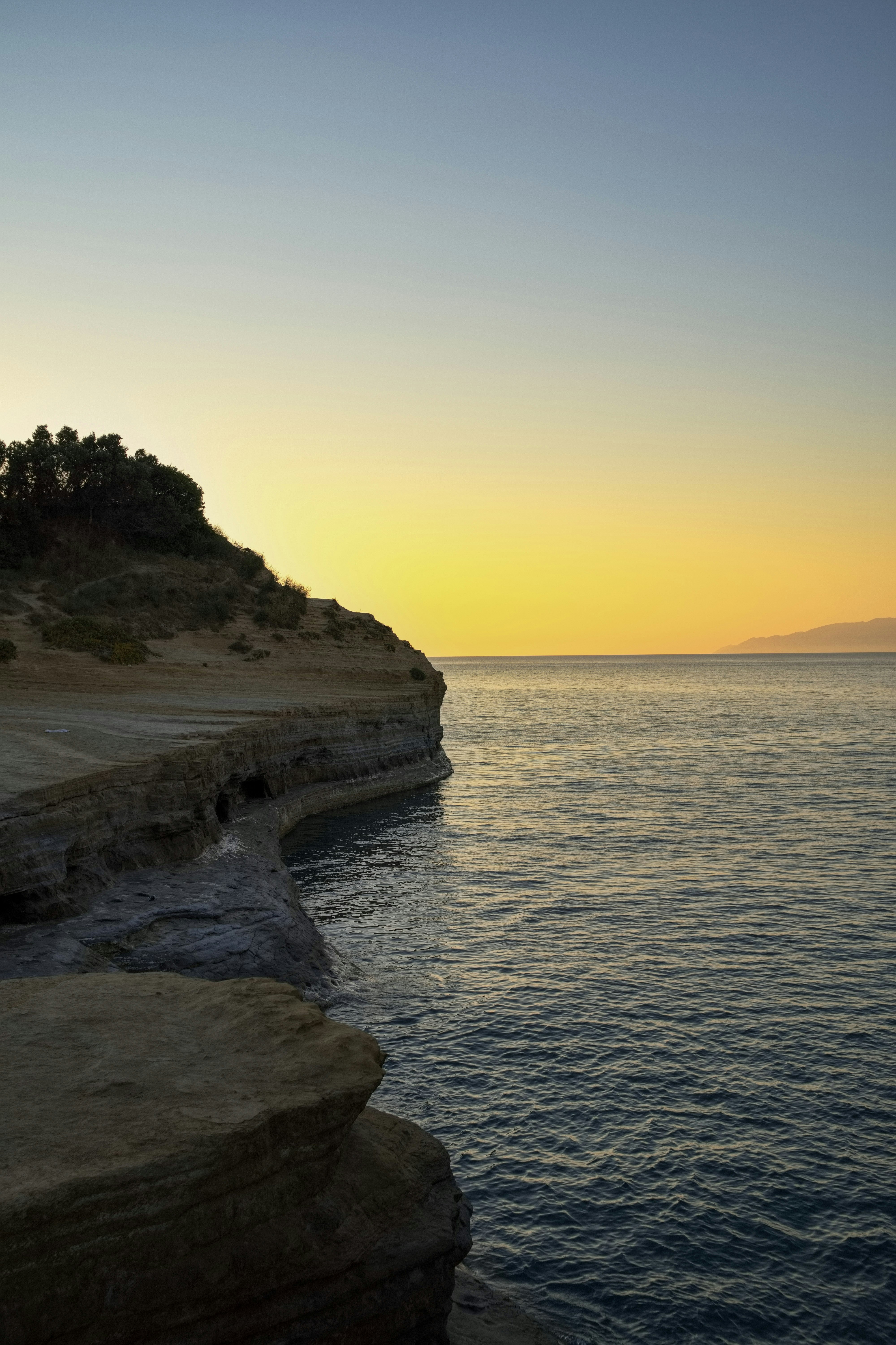 Sunset Over Cliffside Coast