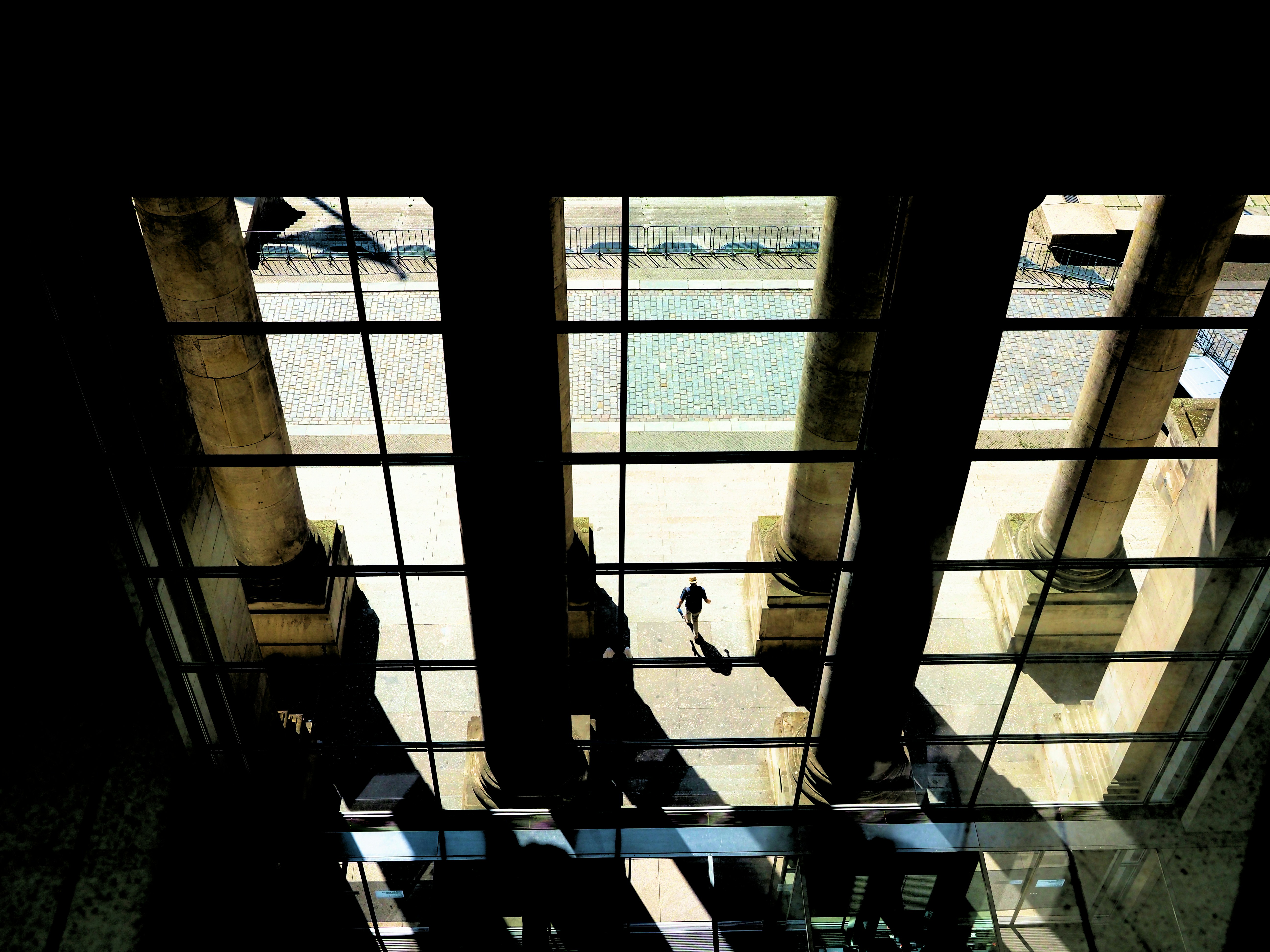 Grid of Light: Shadows Beyond the Pillars