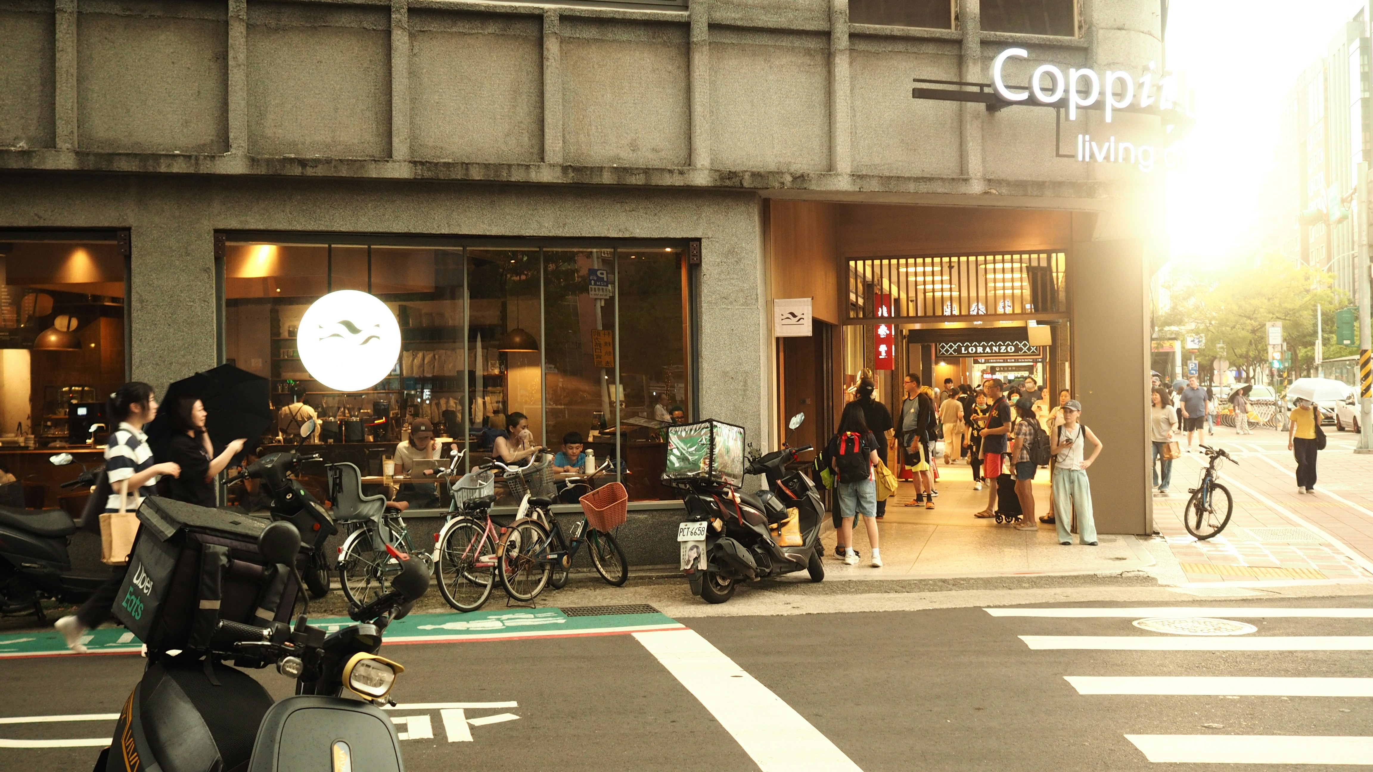 Sunlit Boulevard Café: A Vibrant Street Scene at Dusk