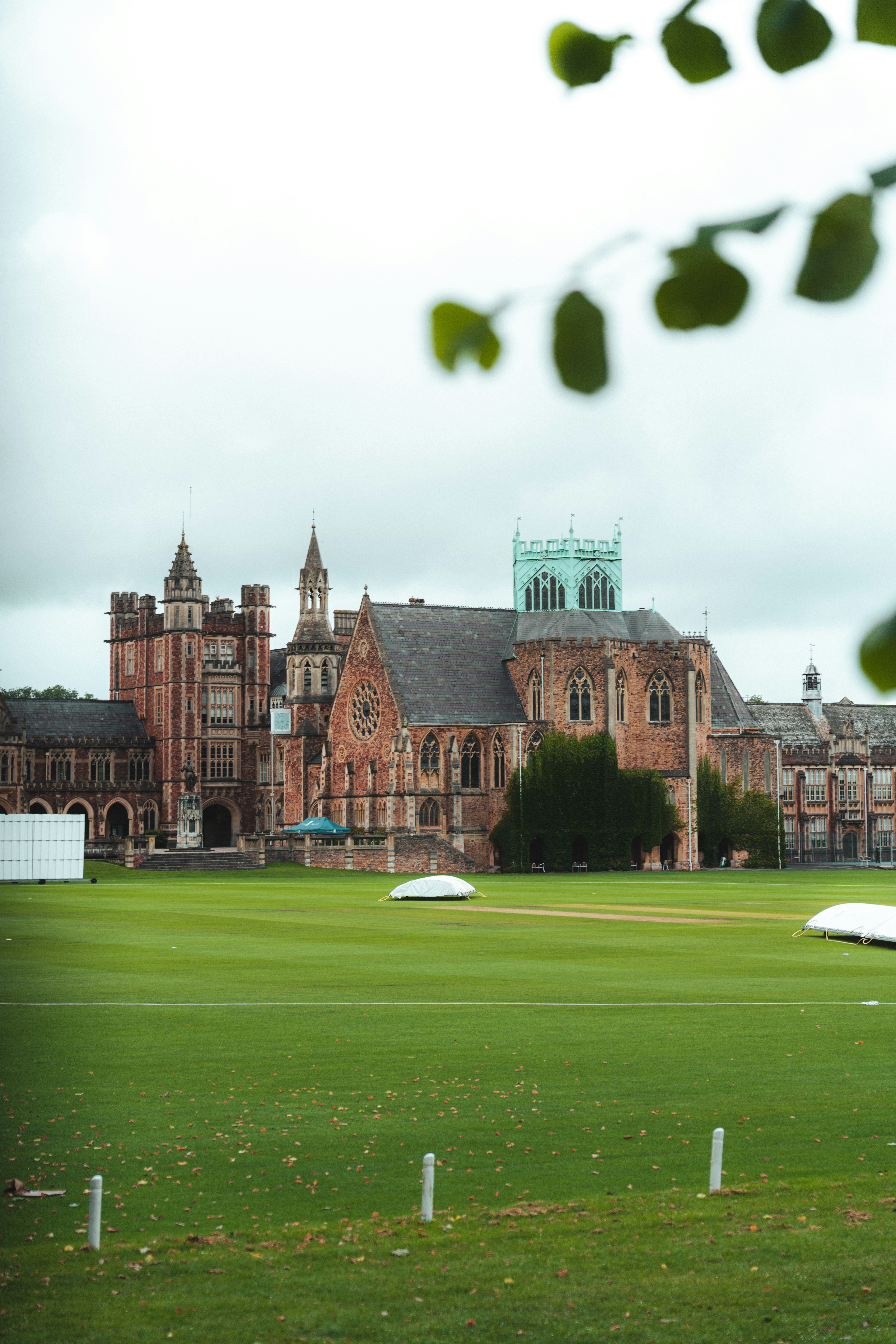 Cathedral-era Campus Seen Across Glistening Lawn