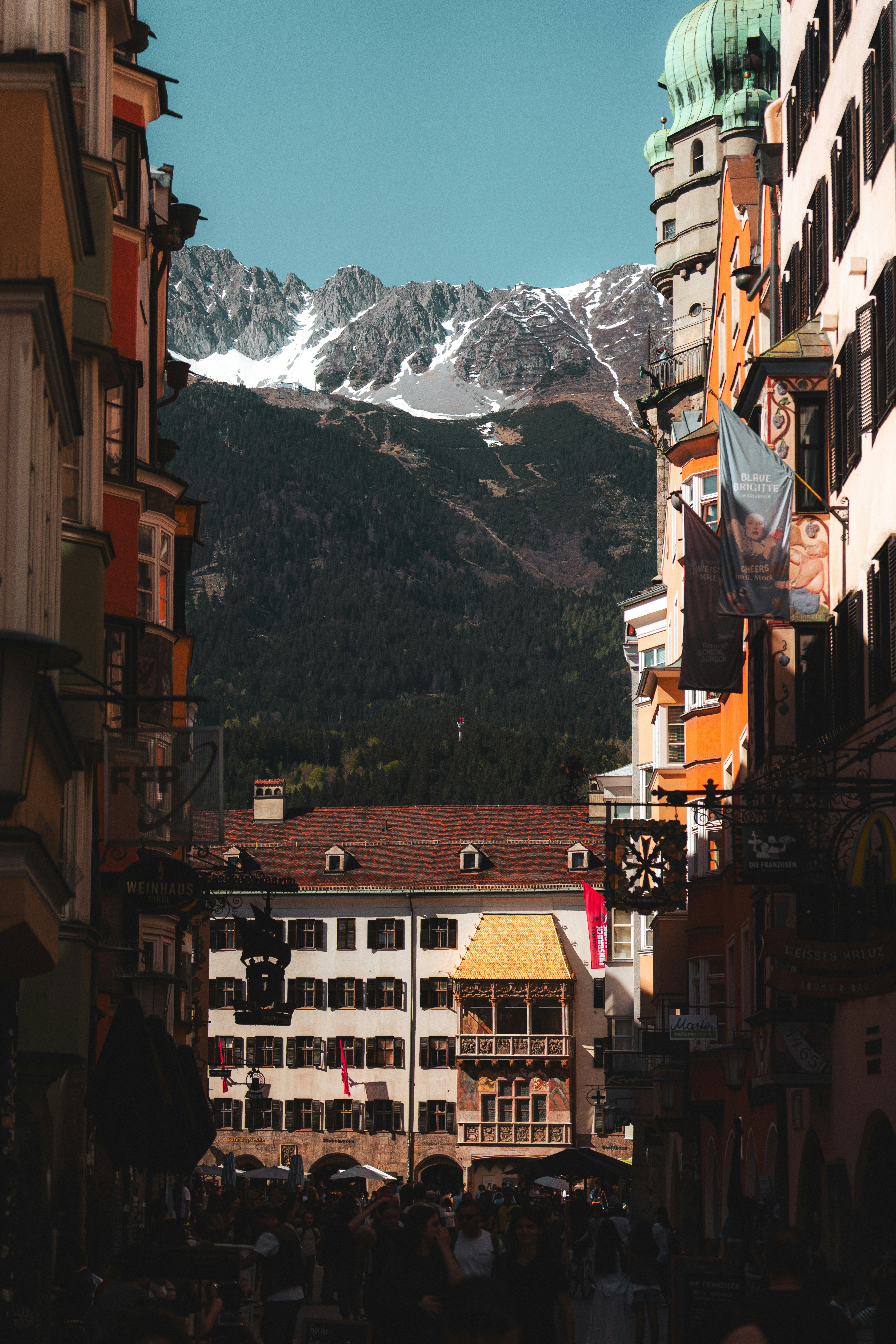 Cobbled Street Toward Alpine Majesty