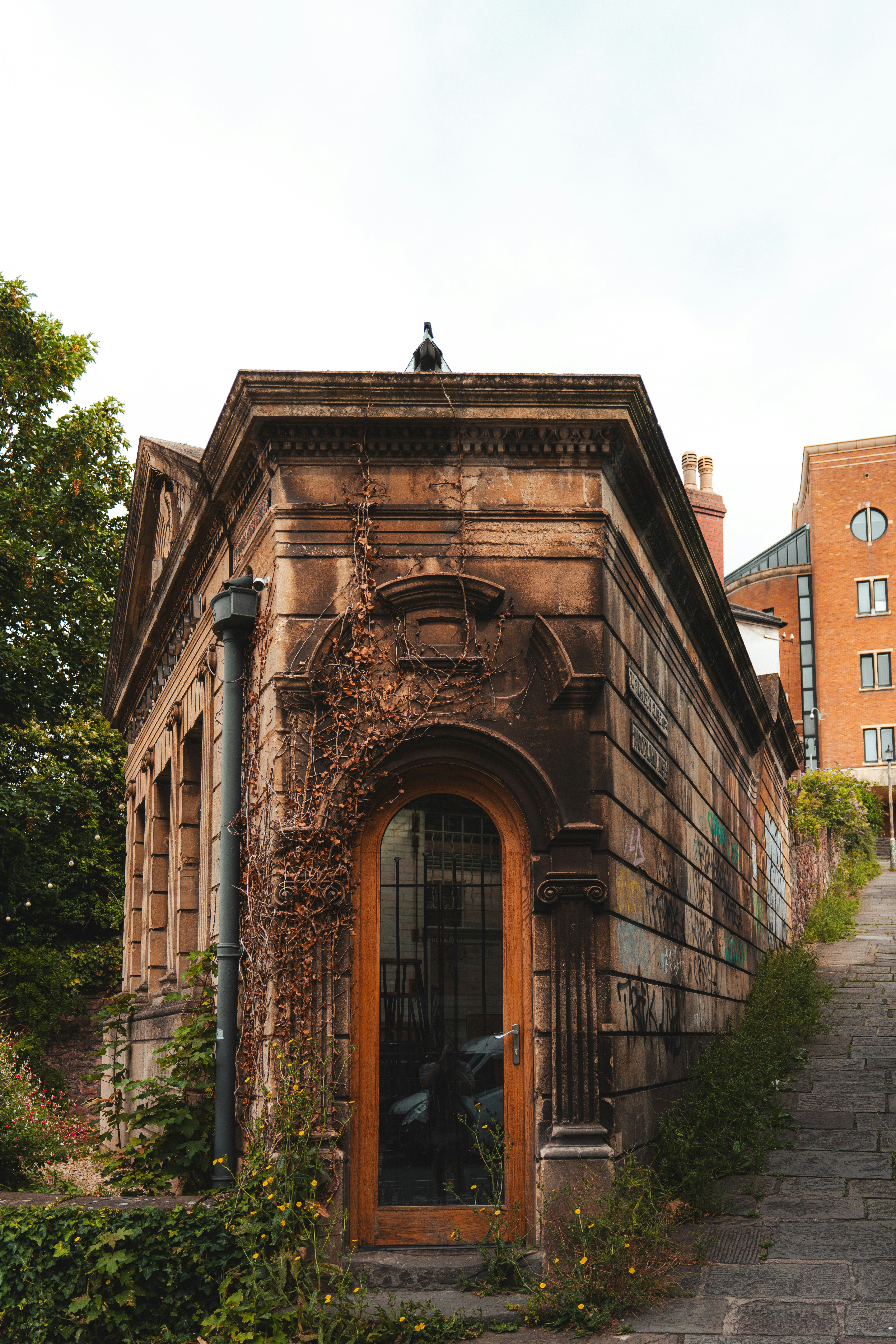 Heritage Staircase: Ivy-Clad Historic Gatehouse