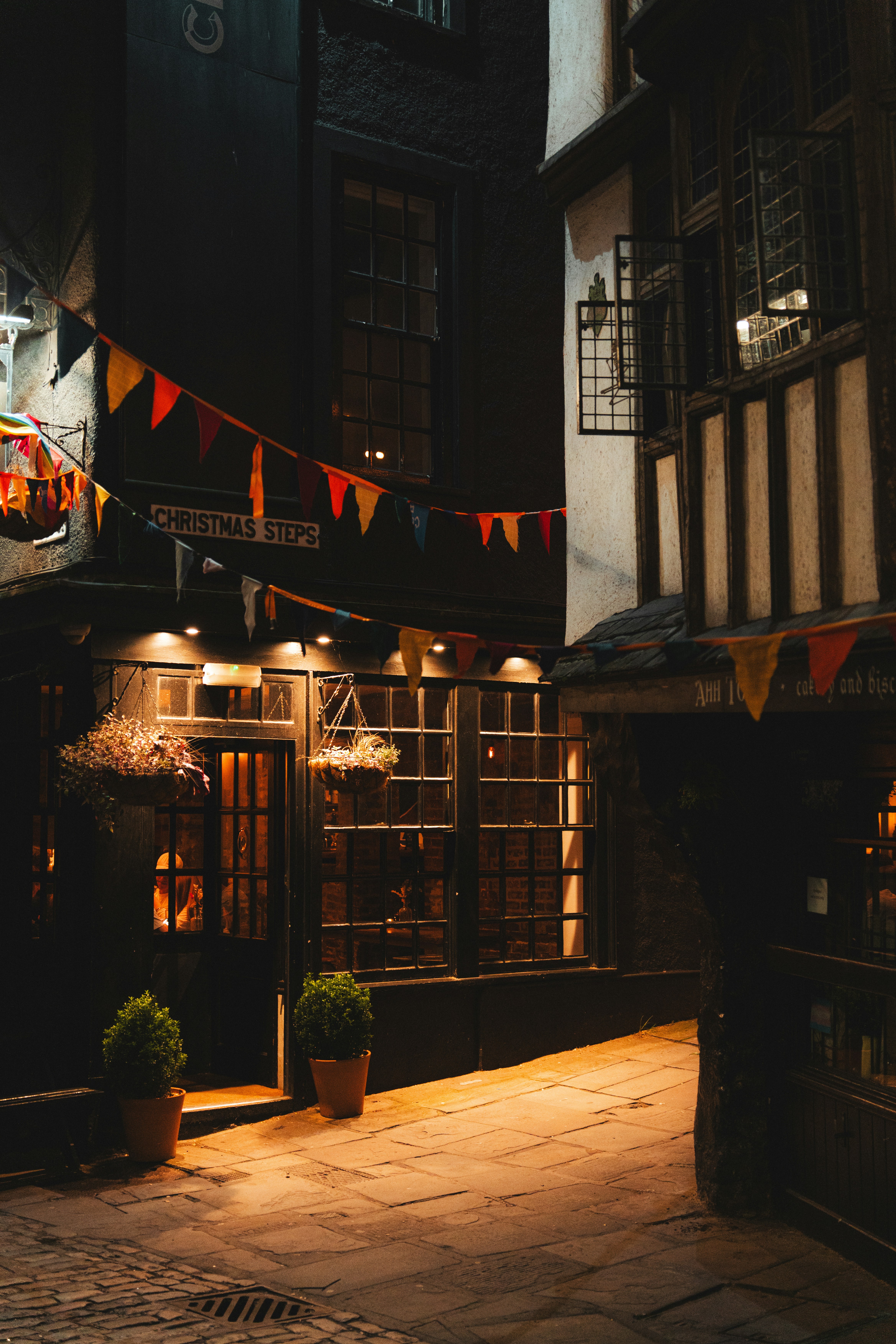 Warm Lanterns on a Dickensian Calle