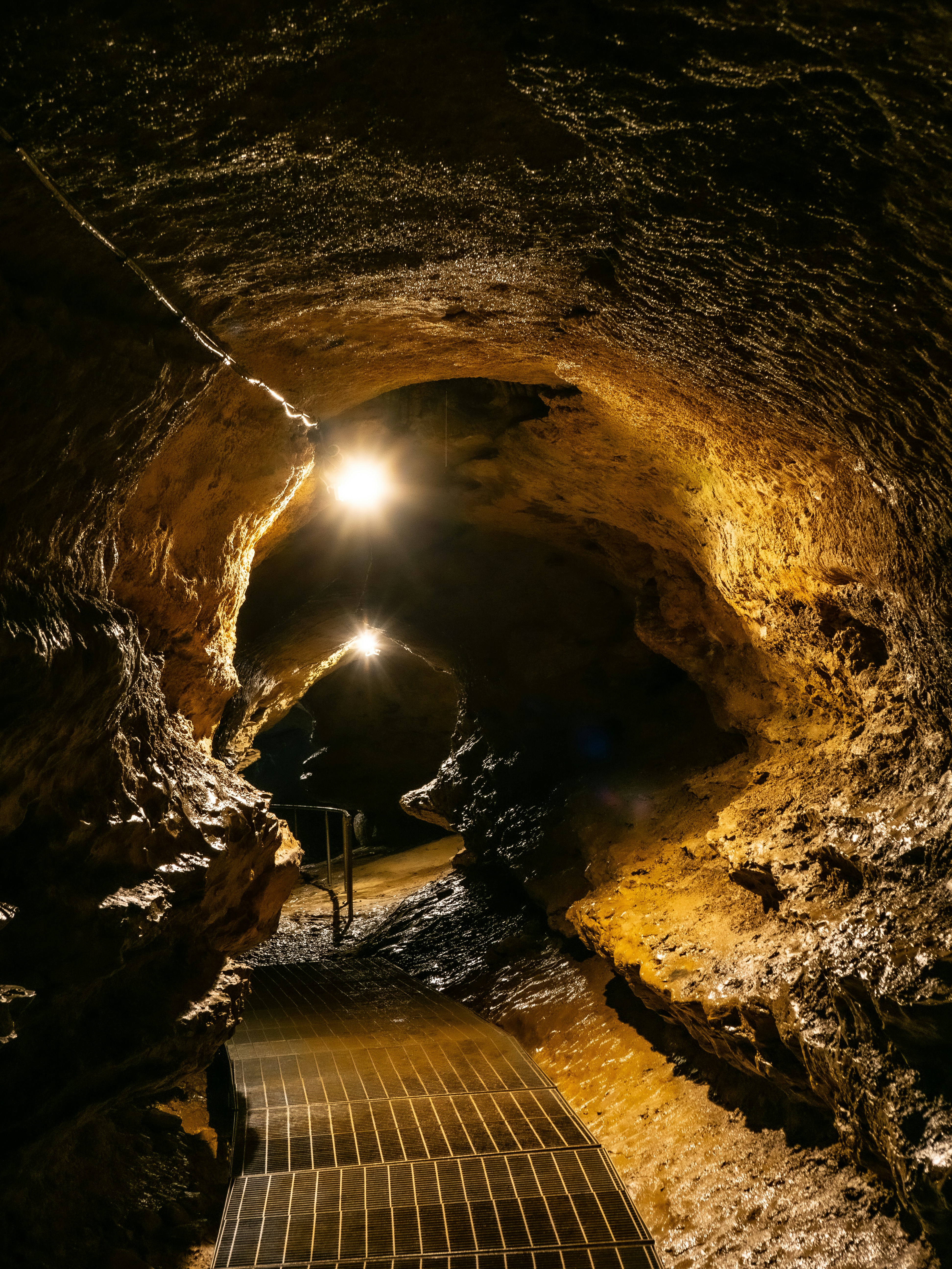 Hallway of Light: A Tunnel Walk Through Golden Limestone
