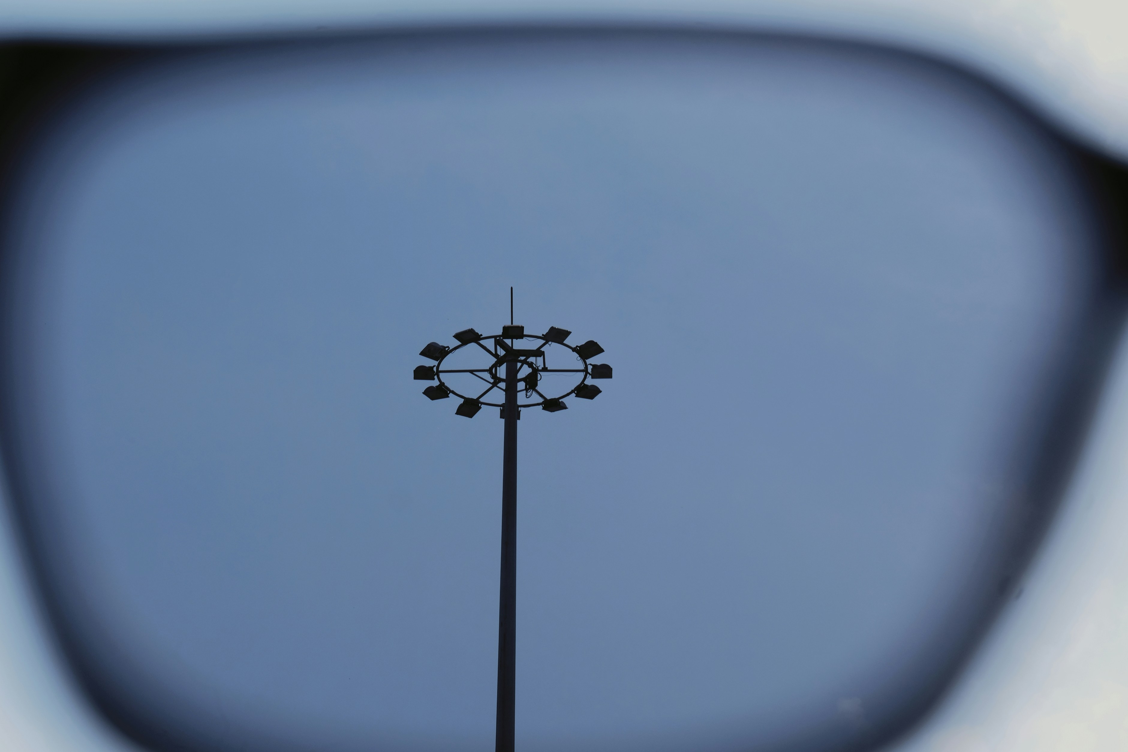 Through the Glass: A Streetlight Ring in Focus