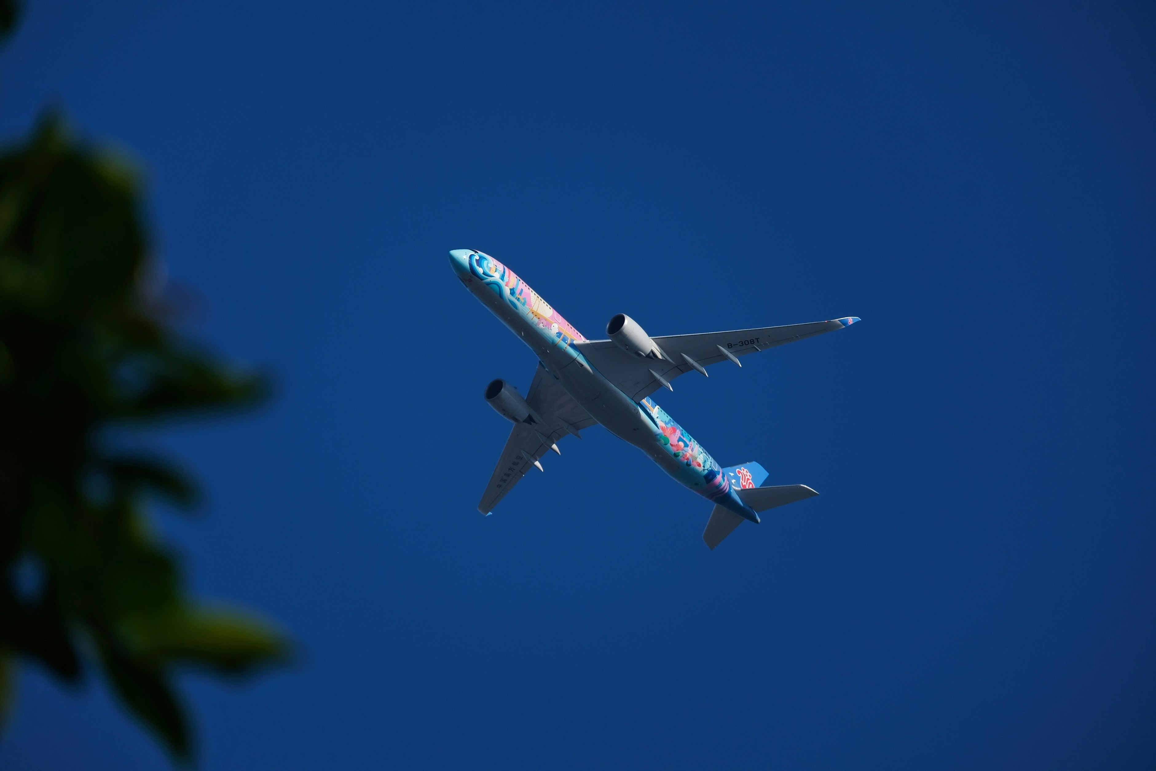 Jet Painted in Sky: Aerial Colorful Form Traverses a Clear Horizon
