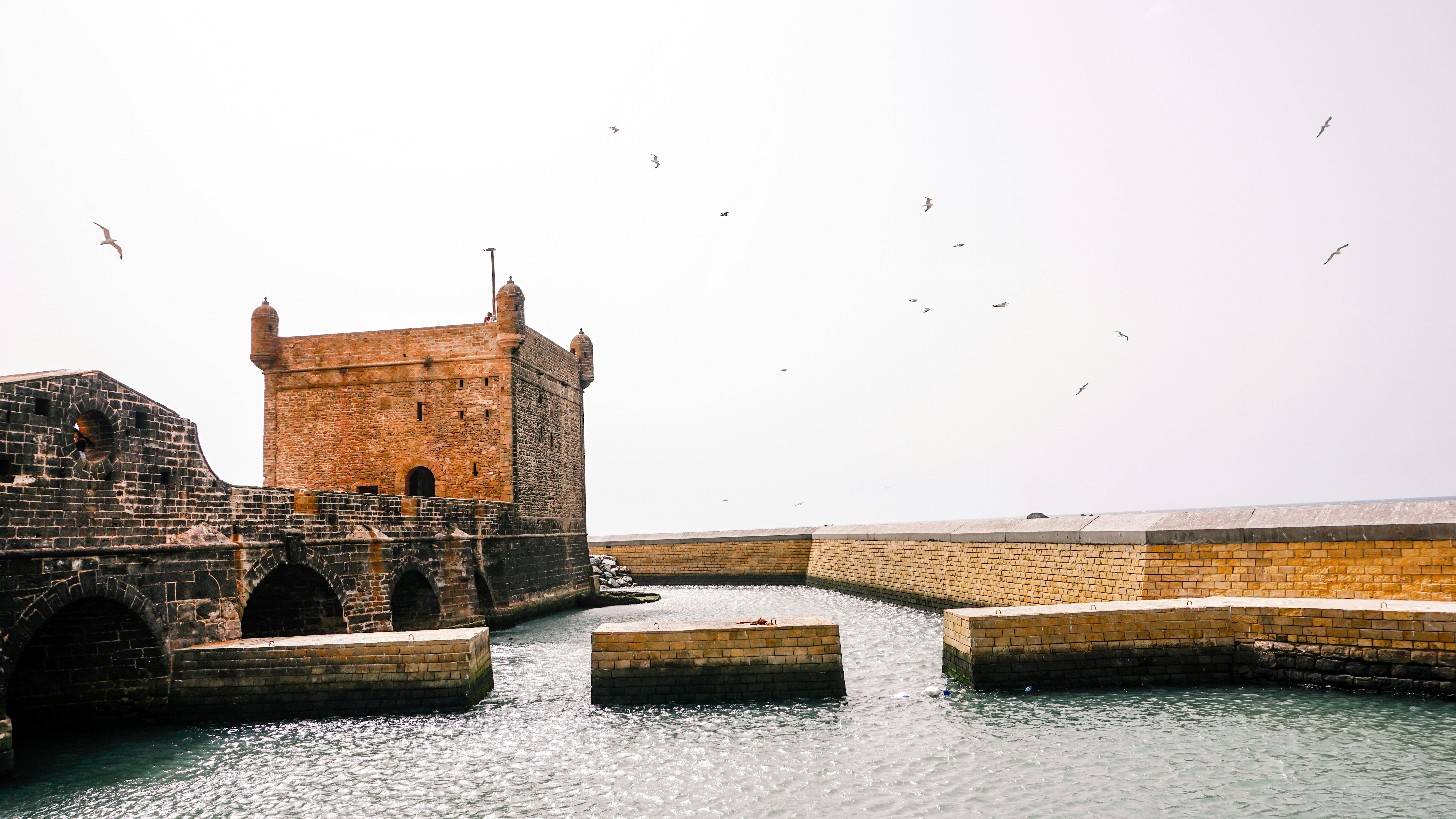 Stone Bastion at Dusk: A Sea-Waring Mirror of Calm