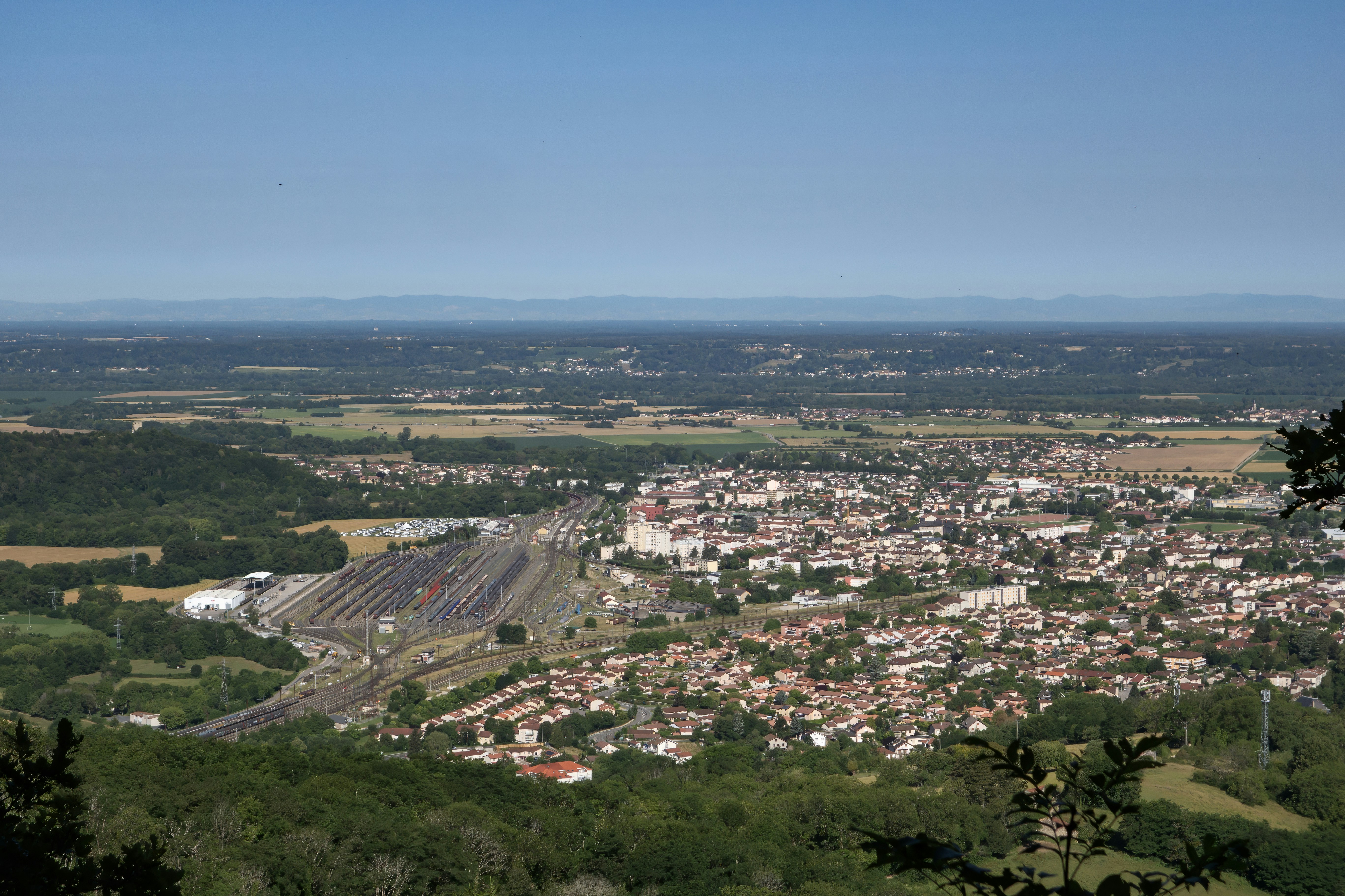 From Green Hills to Creekside City: A Panoramic Valley View