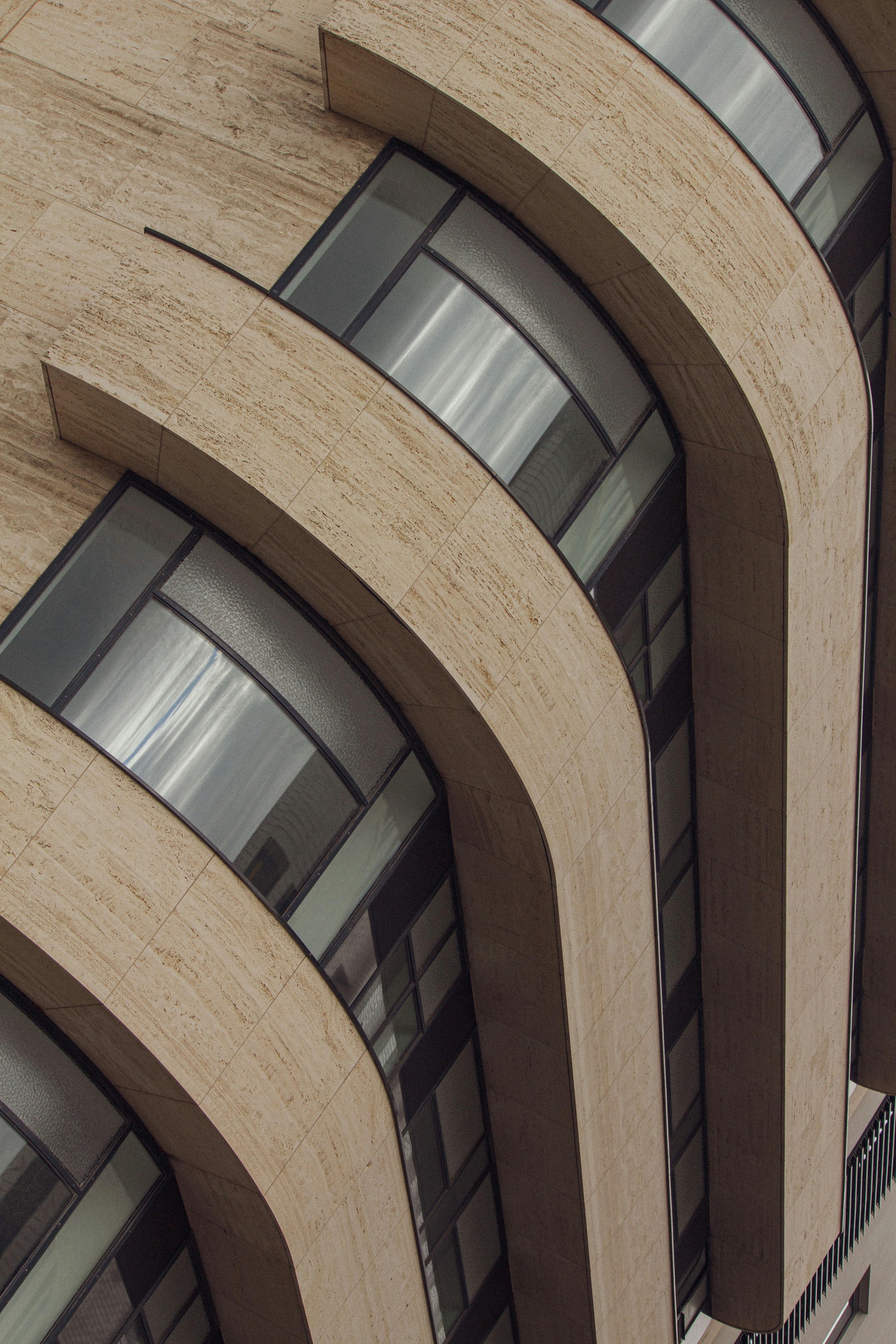Curved brick terraces tracing the rhythm of urban architecture