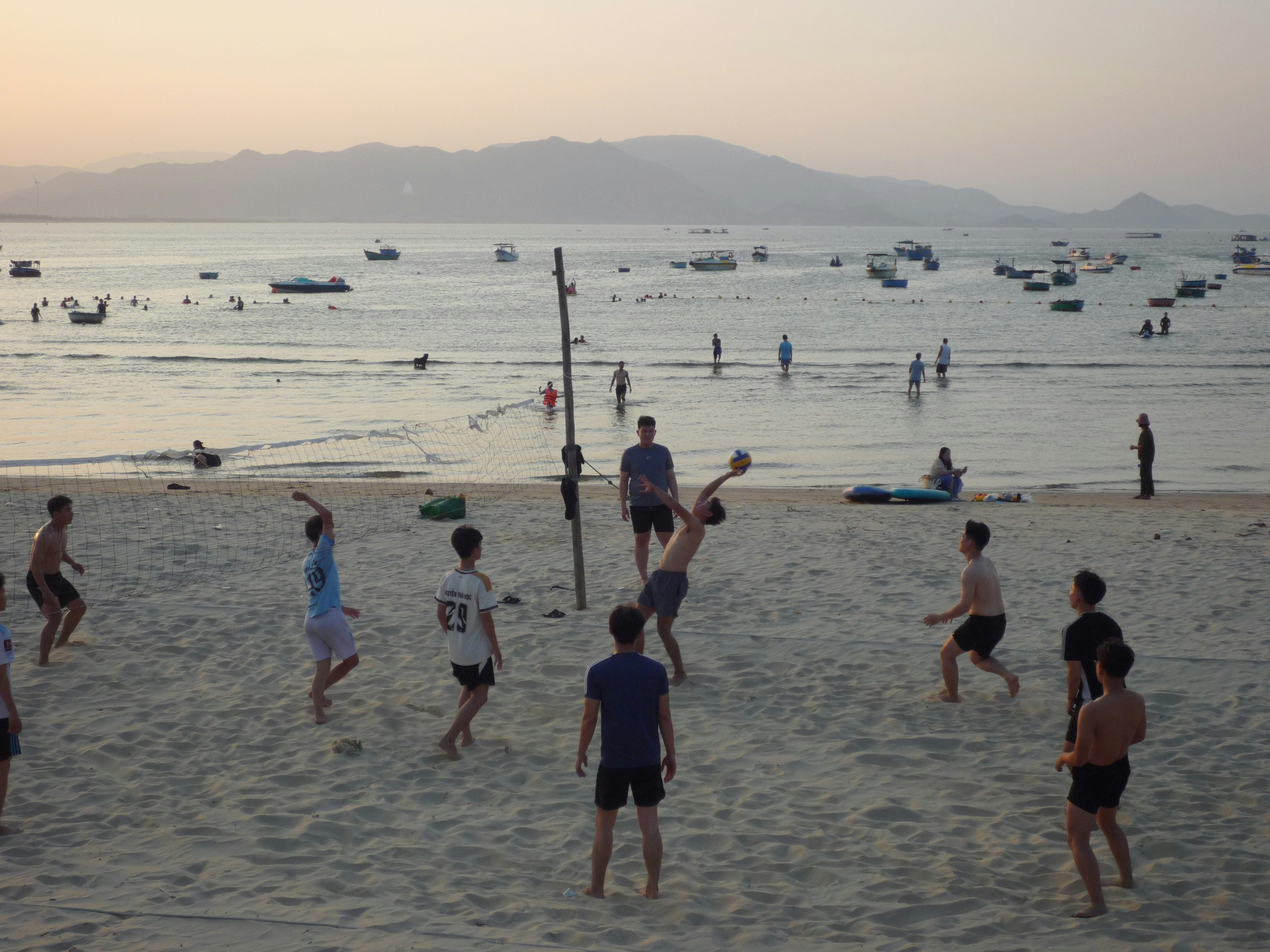 Beach Court: Kids and Players in a Soft Sunset Court