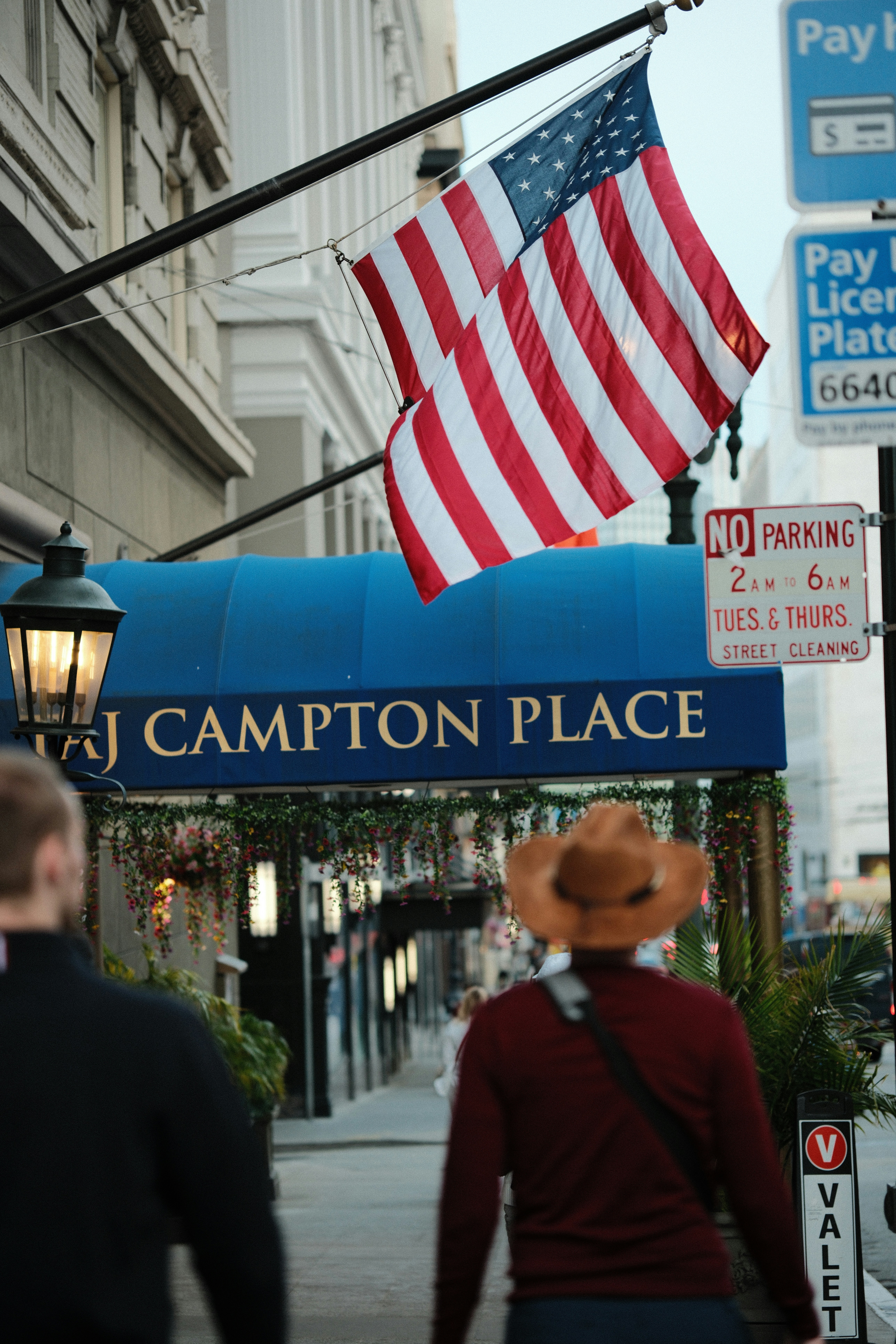 American Flag Over Campton Place Sign in a City Street
