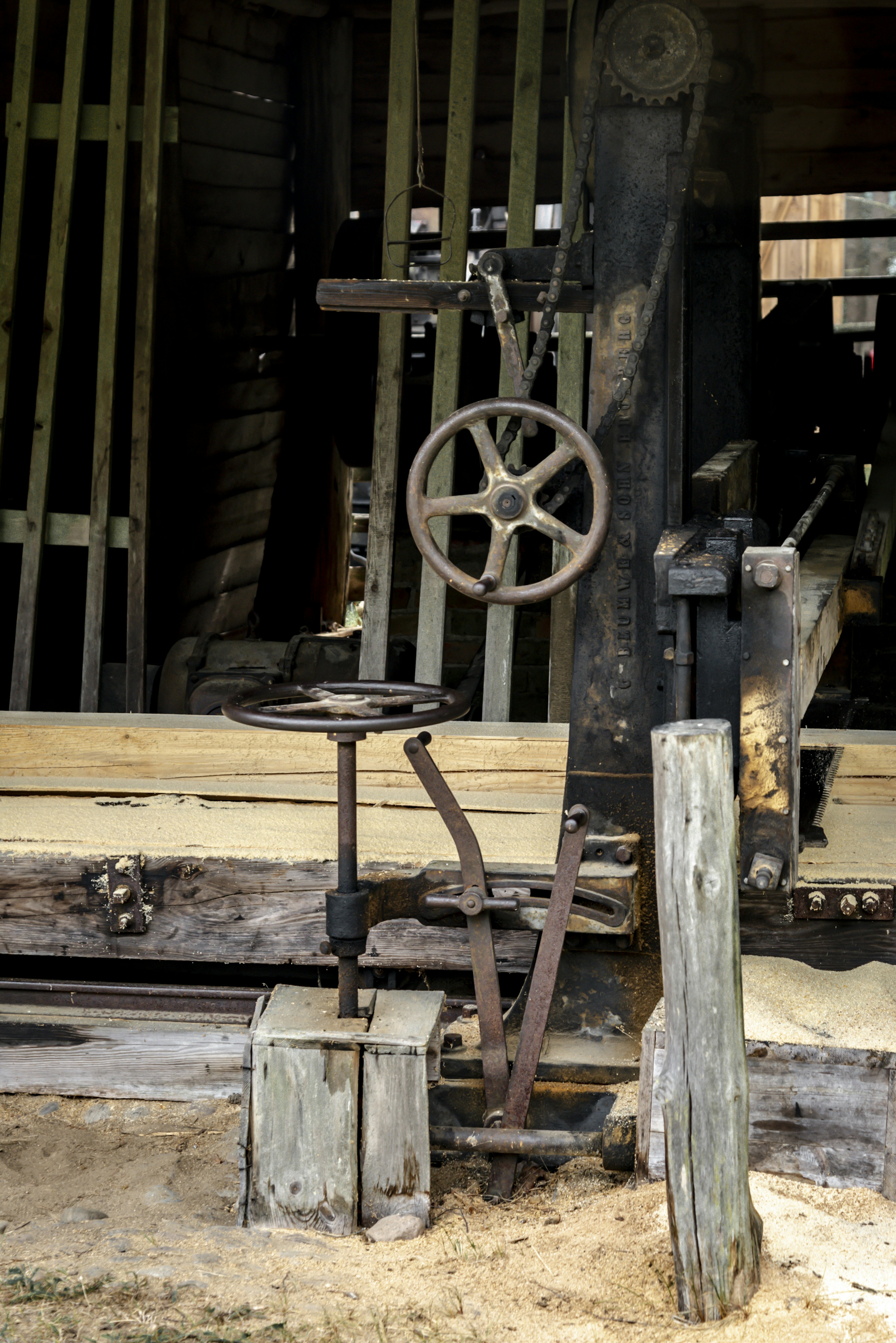The Weathered Uprising: A Scene of Rusted Mechanisms and Timber
