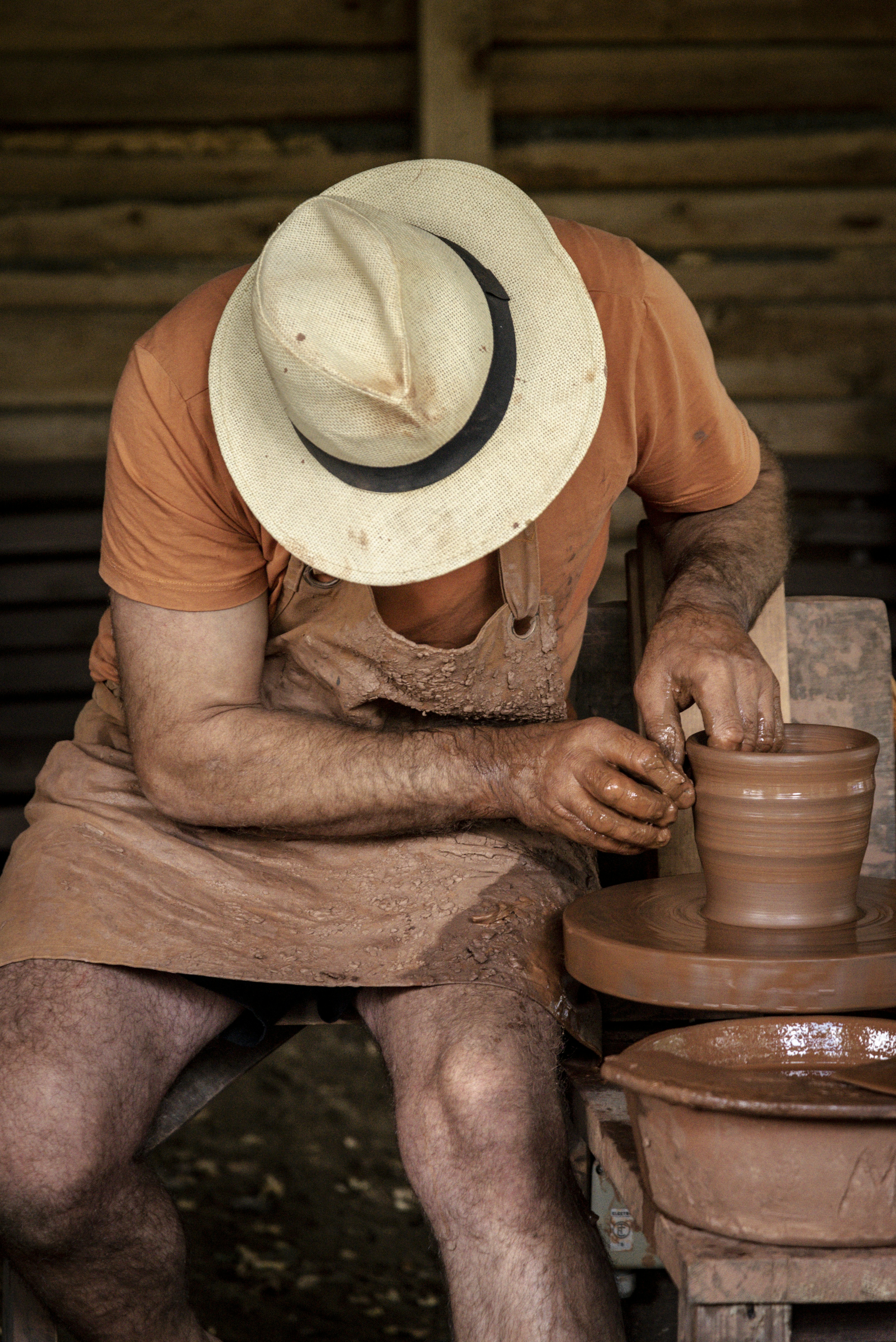 Potter's Quiet Focus at the Wheel