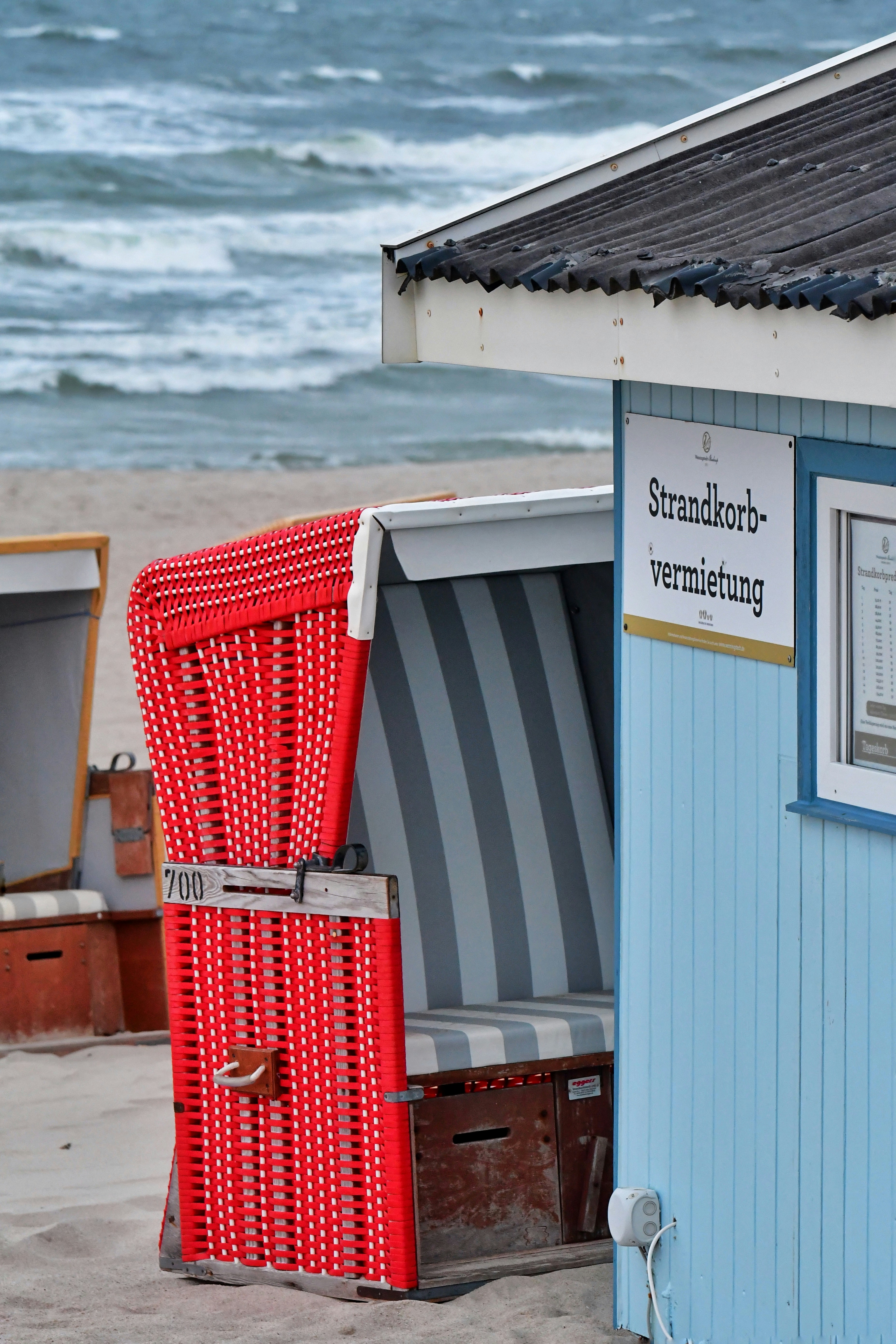Beach Hut by the Wind-Swept Shore