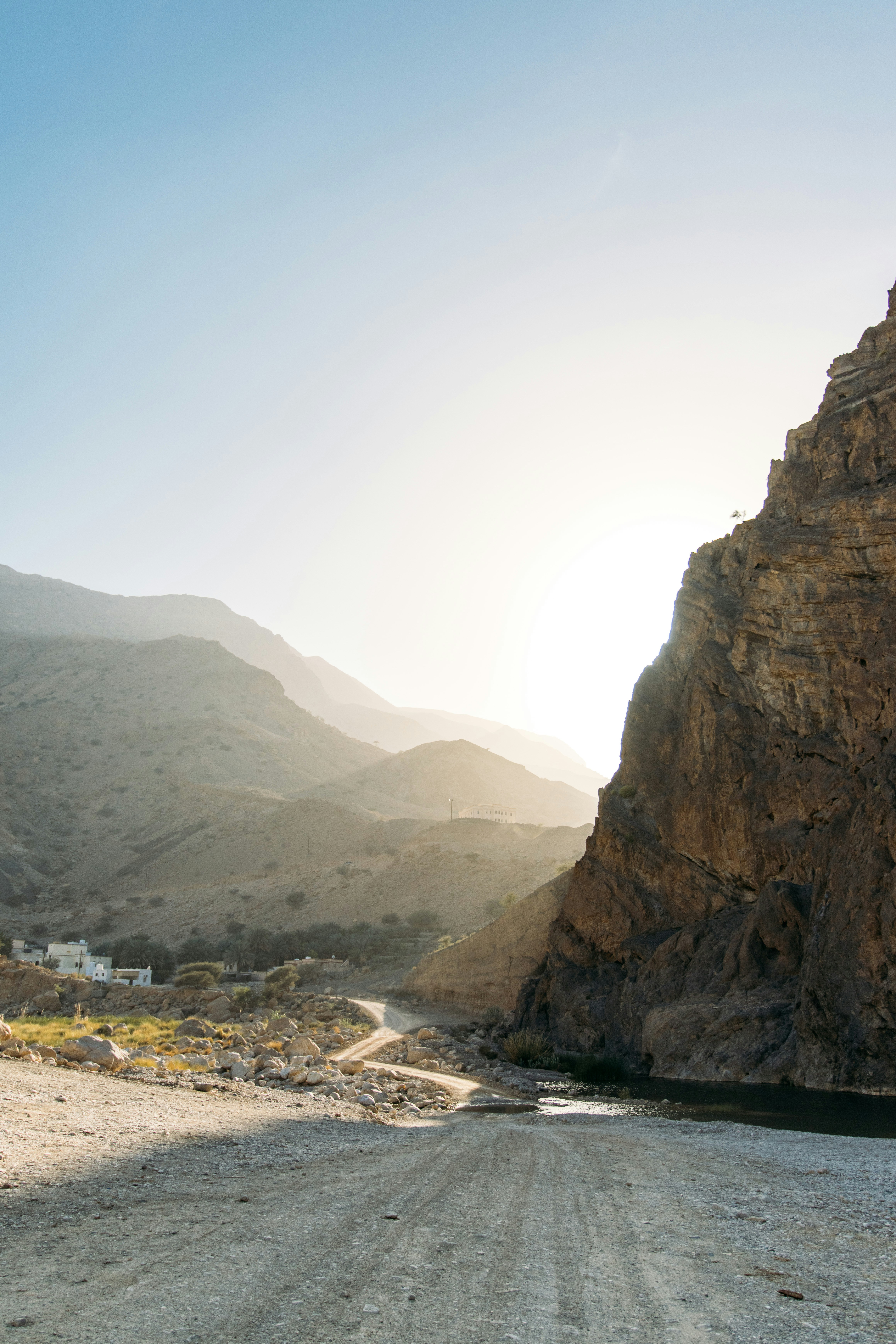 Sunlit Canyon Approach: A Quiet Coastal Mountain Path Toward the Sea
