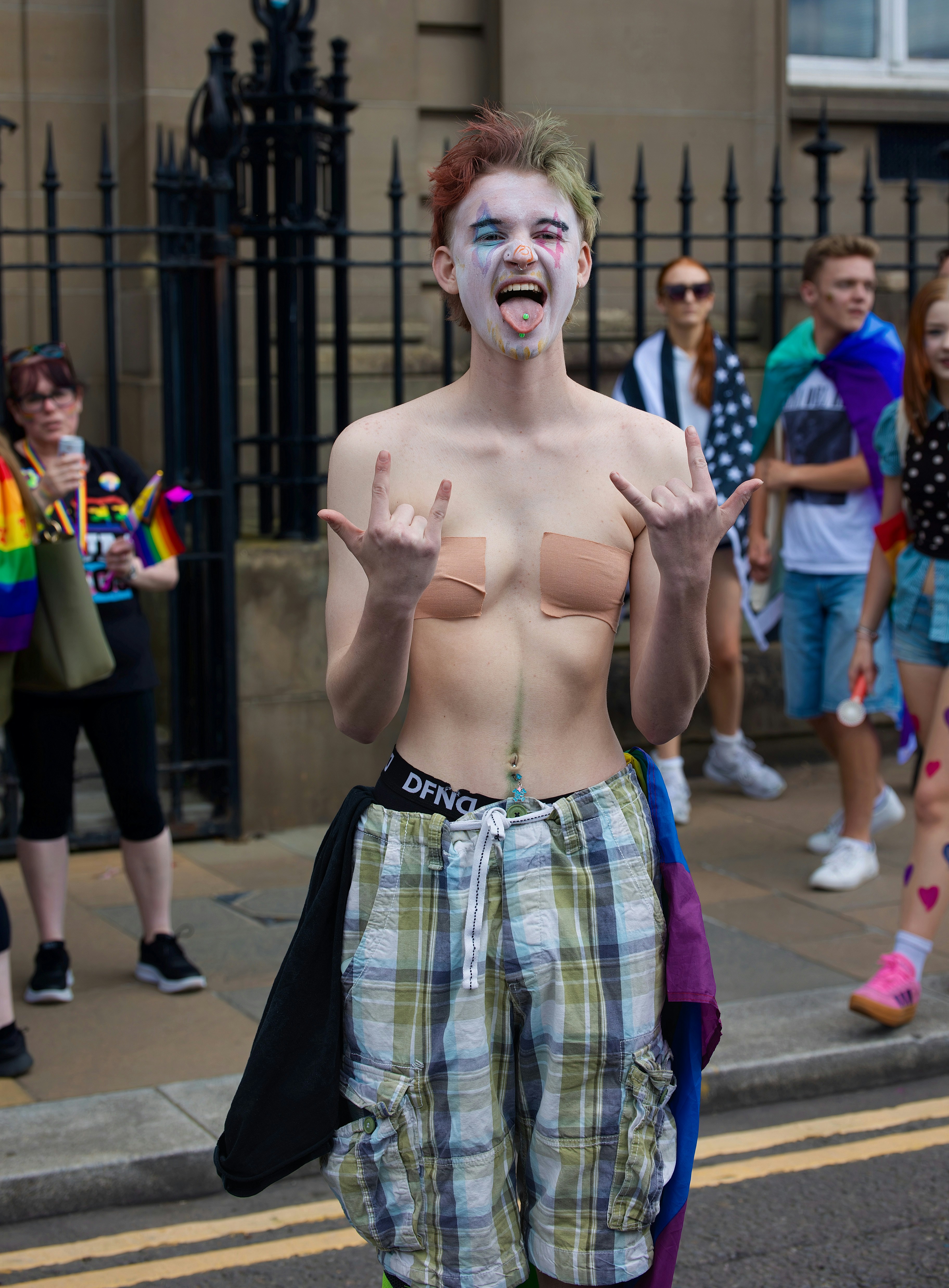 Front-and-Center Prank: Face Paint and Pose at the Pride Parade