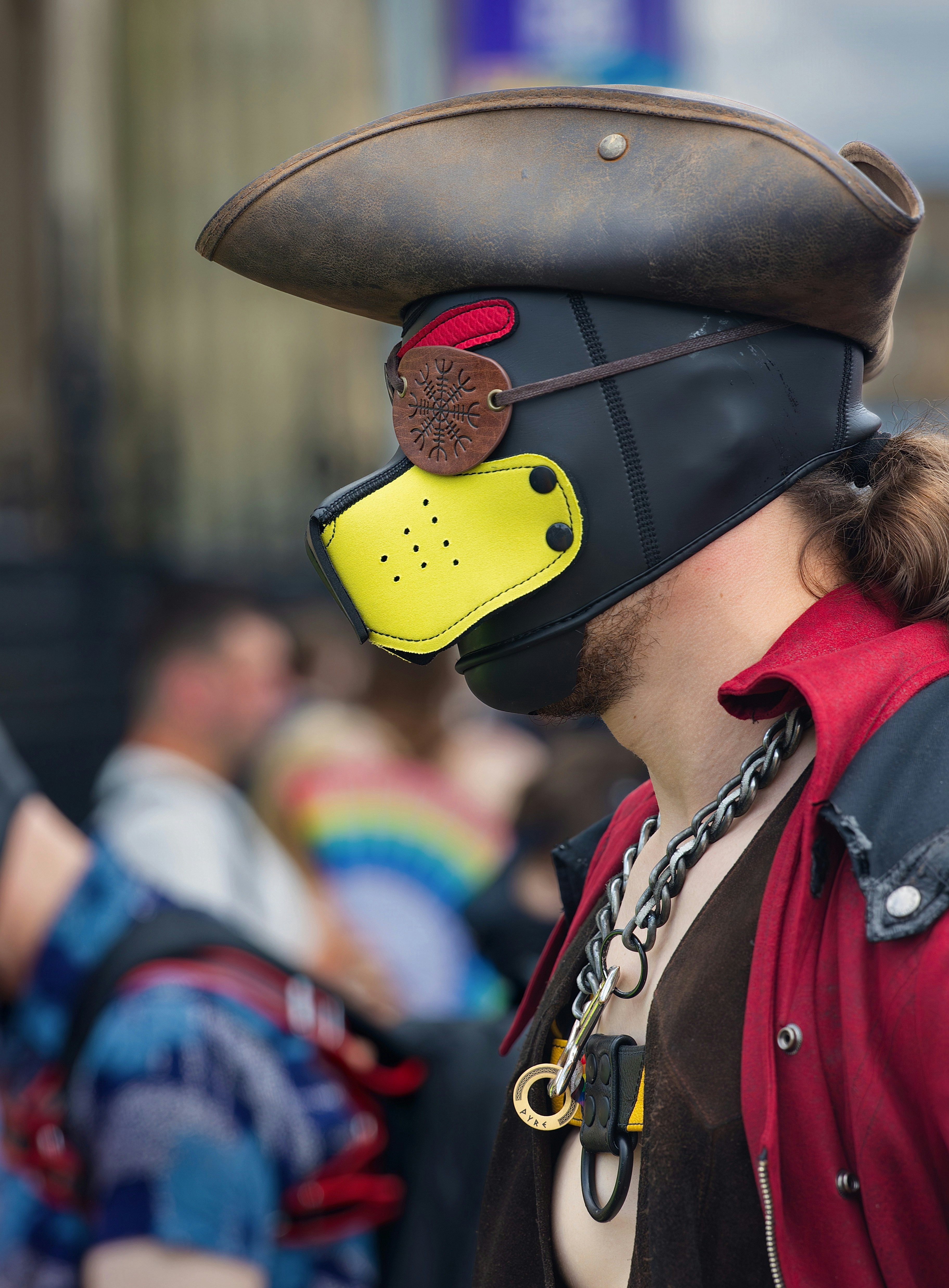 Masked Rider in Weathered Hat at a Prime Street Scene