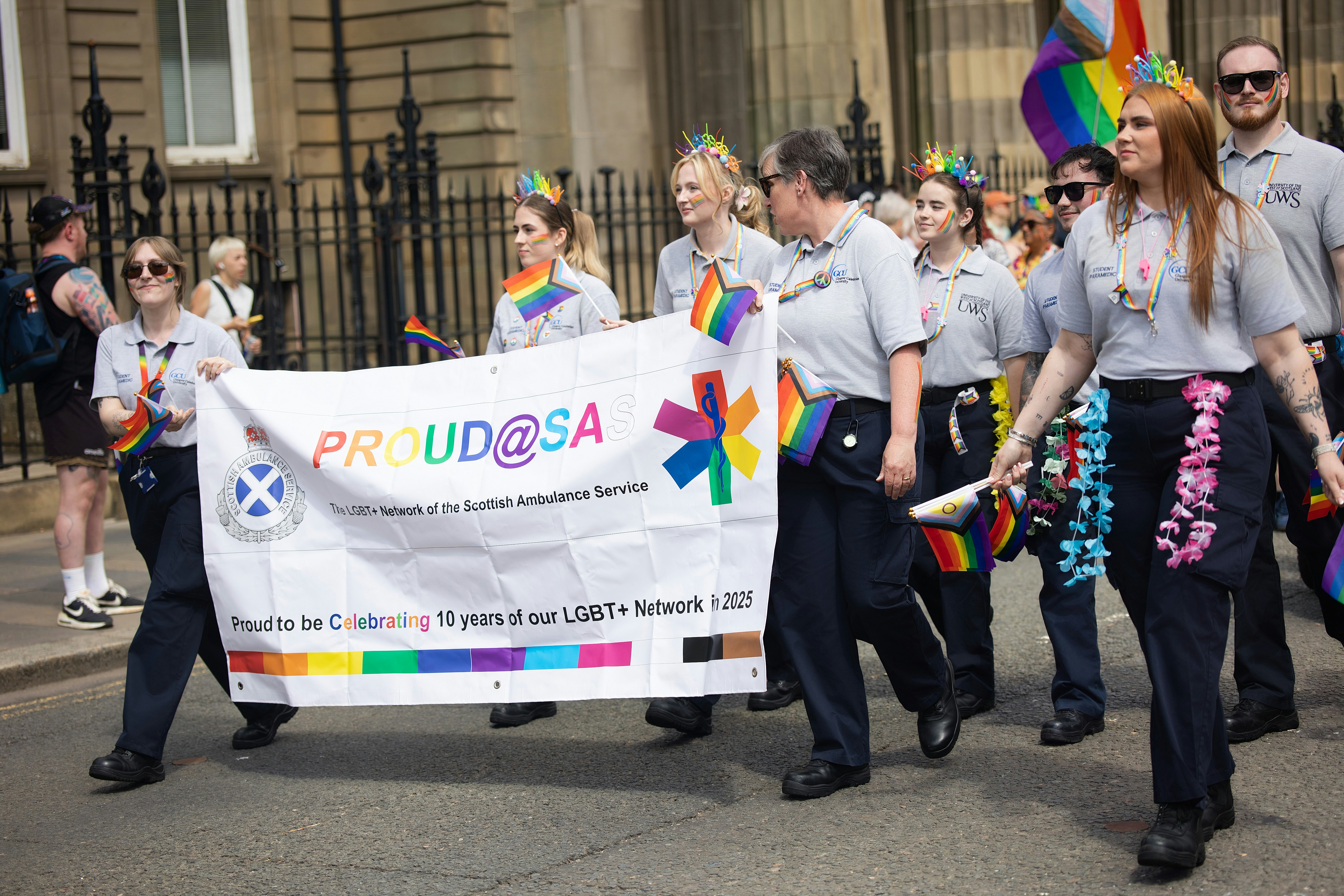 Pride Parade Banner Leads a March of Color and Camaraderie