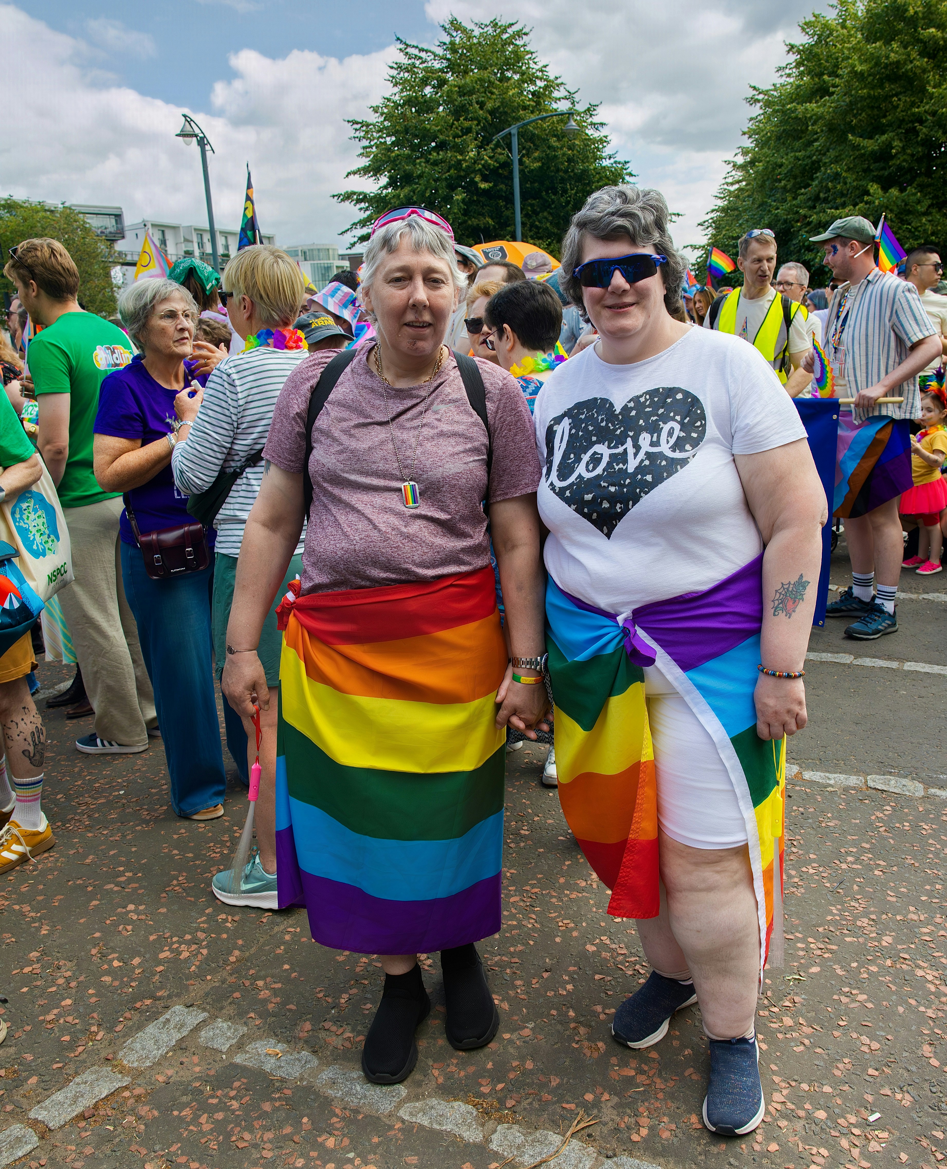 Rainbow Pride, Shared Spotlight: Two Women Standing Side by Side
