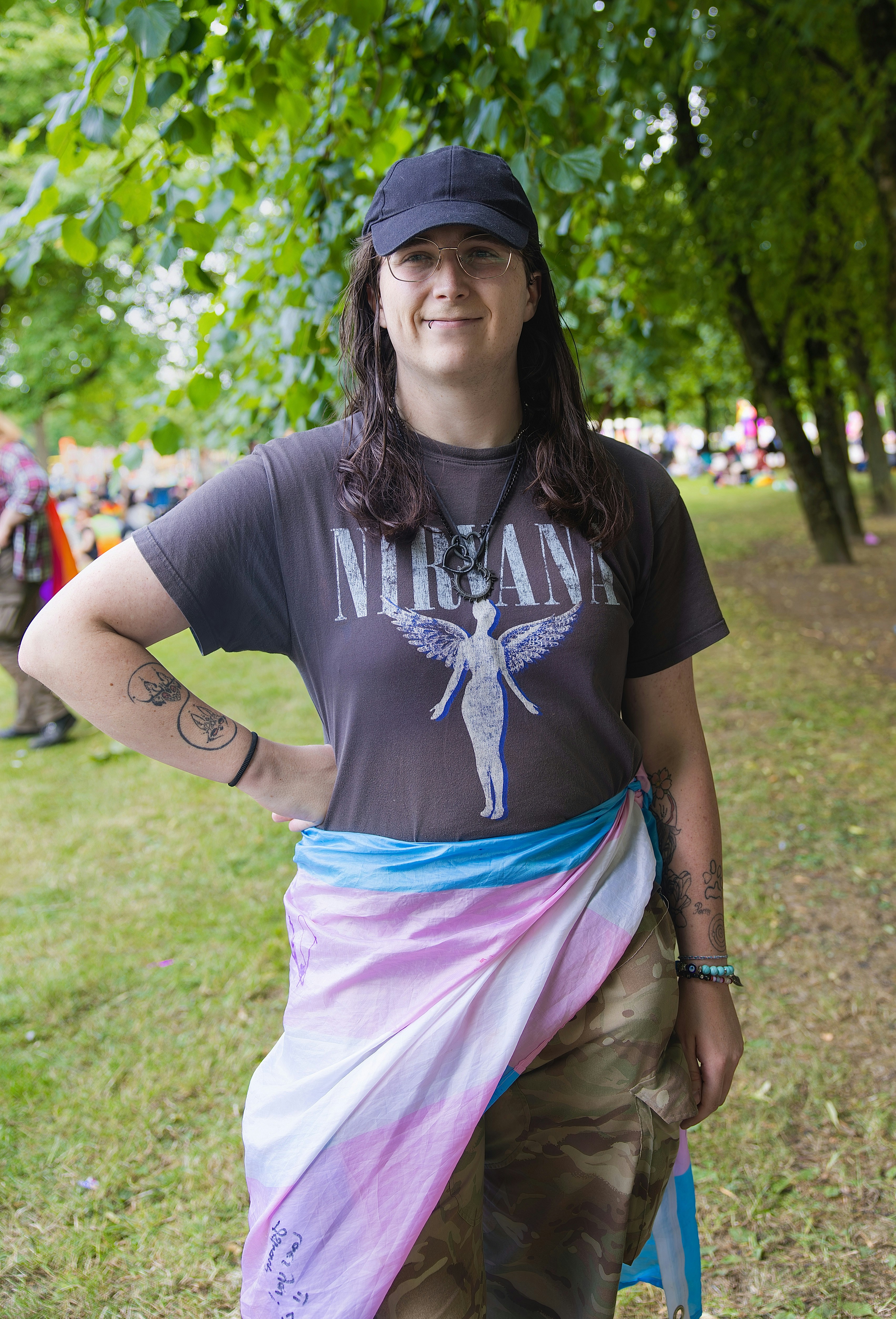 Portrait in the Park: Defiant Confidence Under the Shade