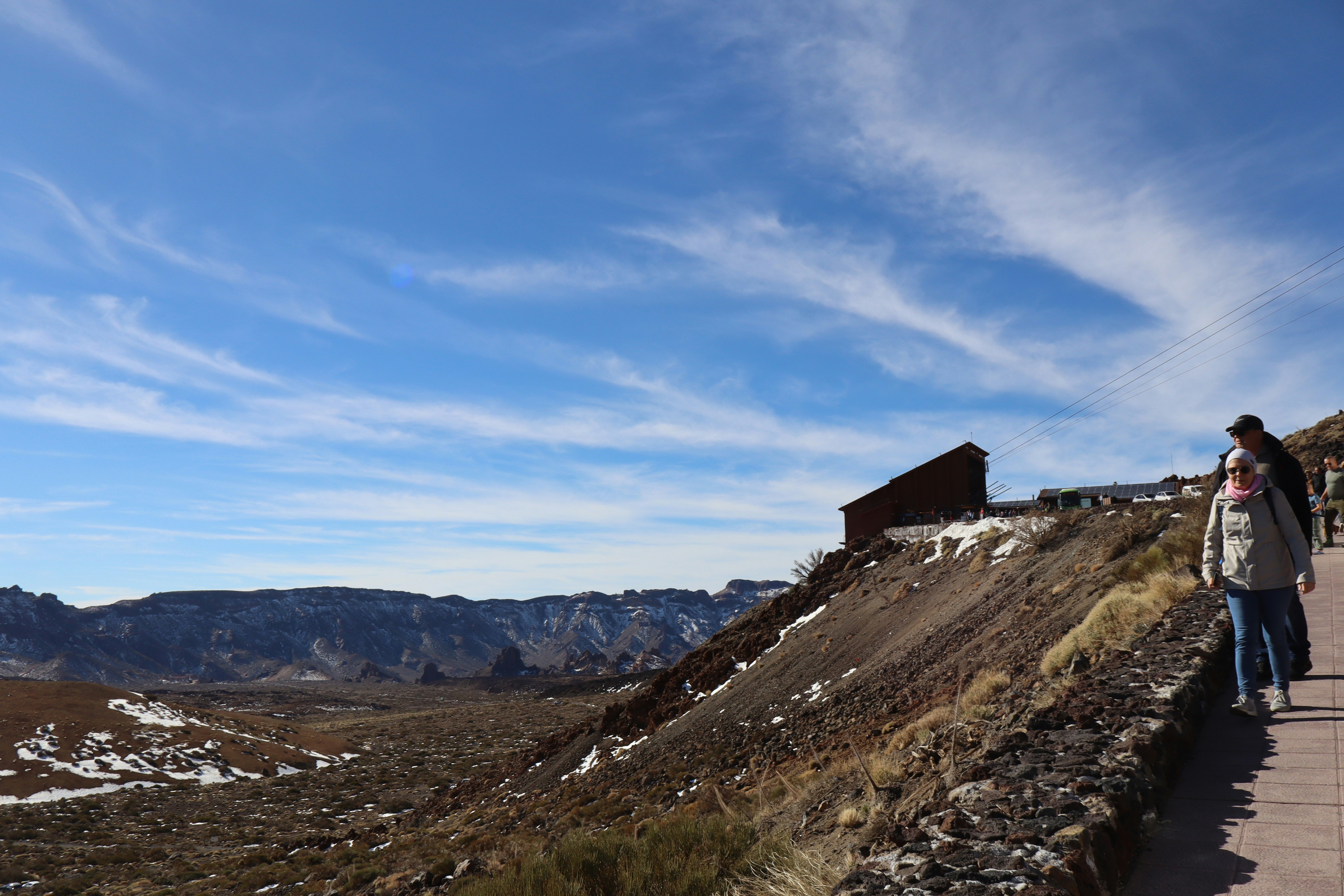 Pathway to the Vista: Travelers at the Cliff Edge