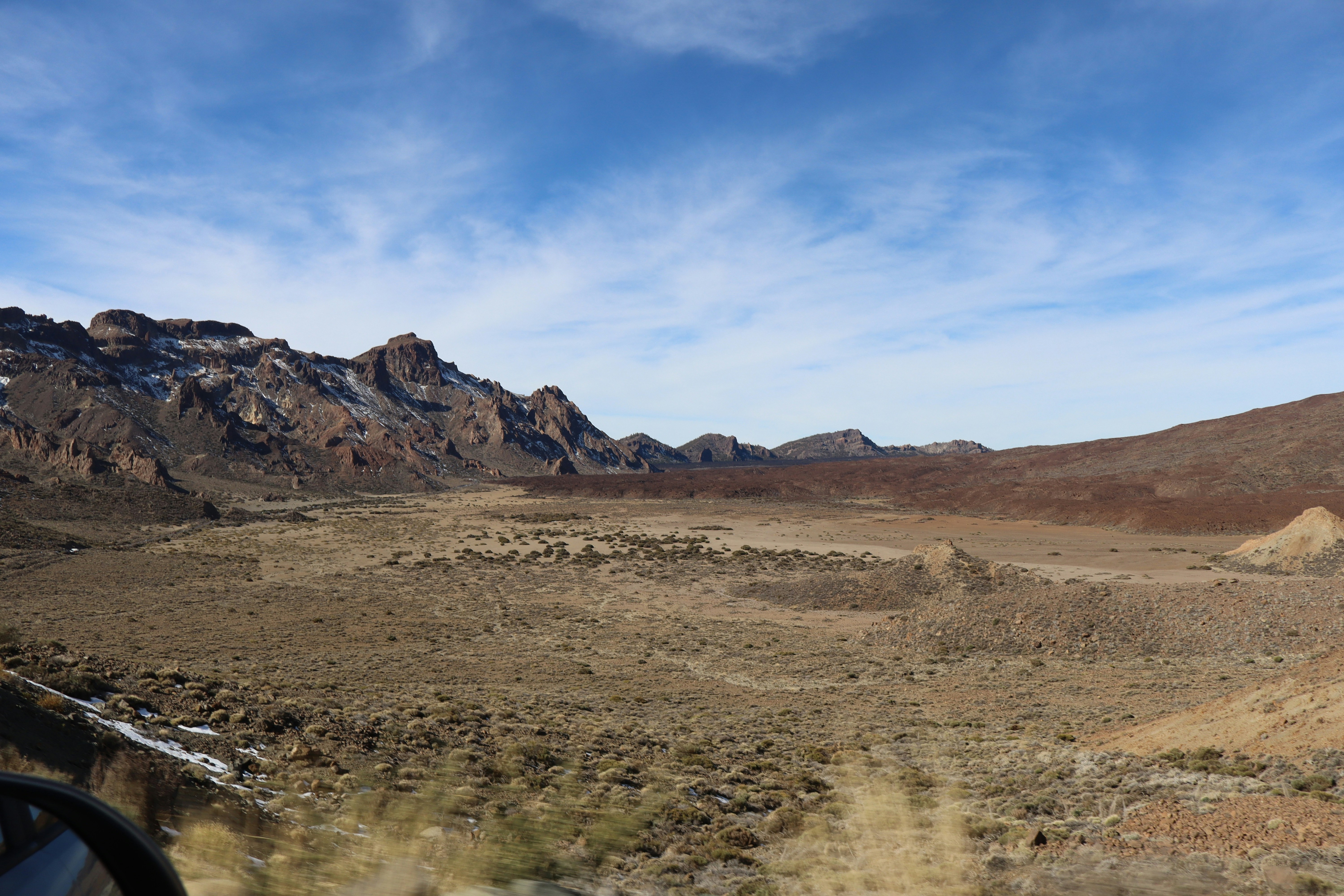 Desert Rim Under a Wide Blue Sky